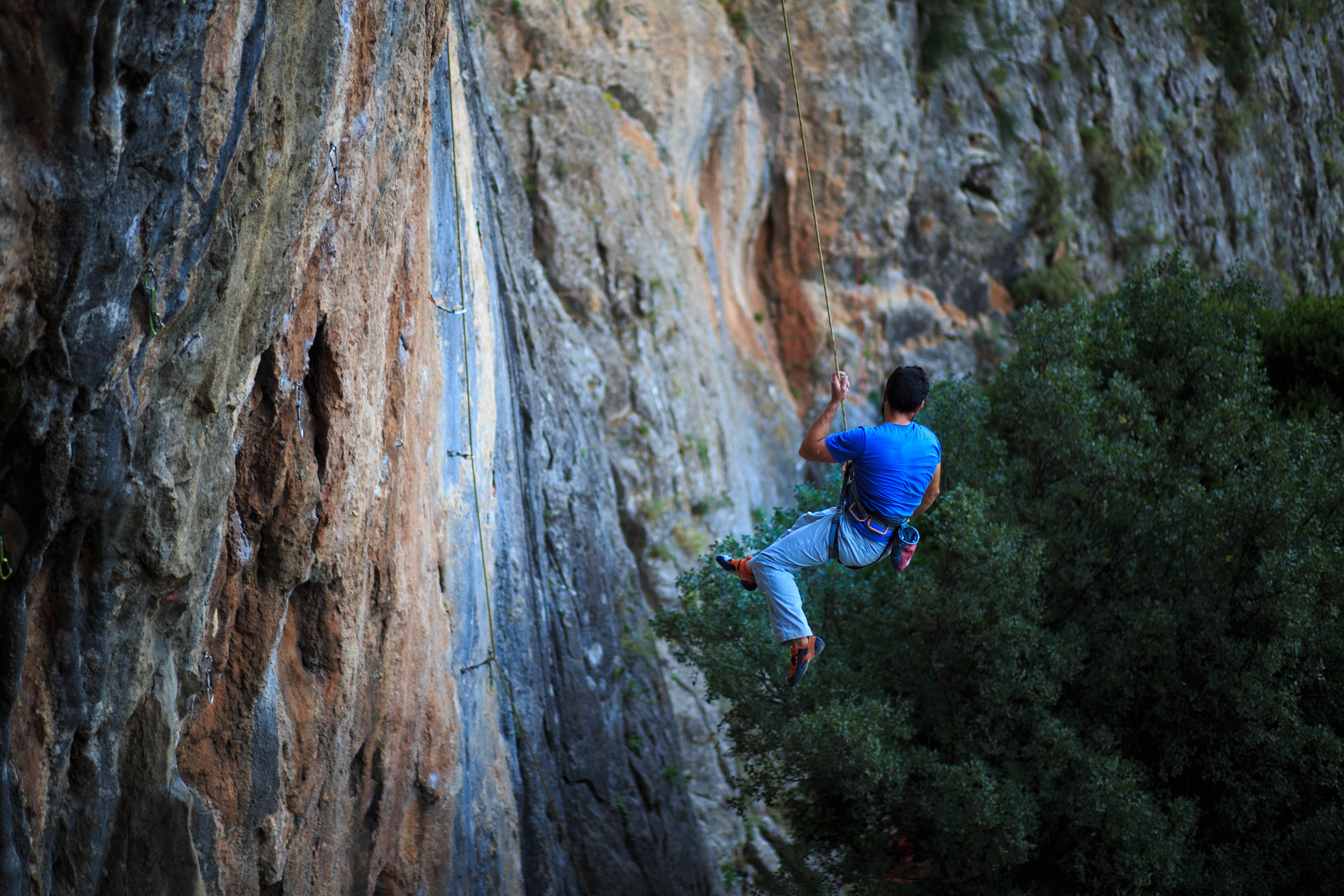 Person Rock Climbing · Free Stock Photo
