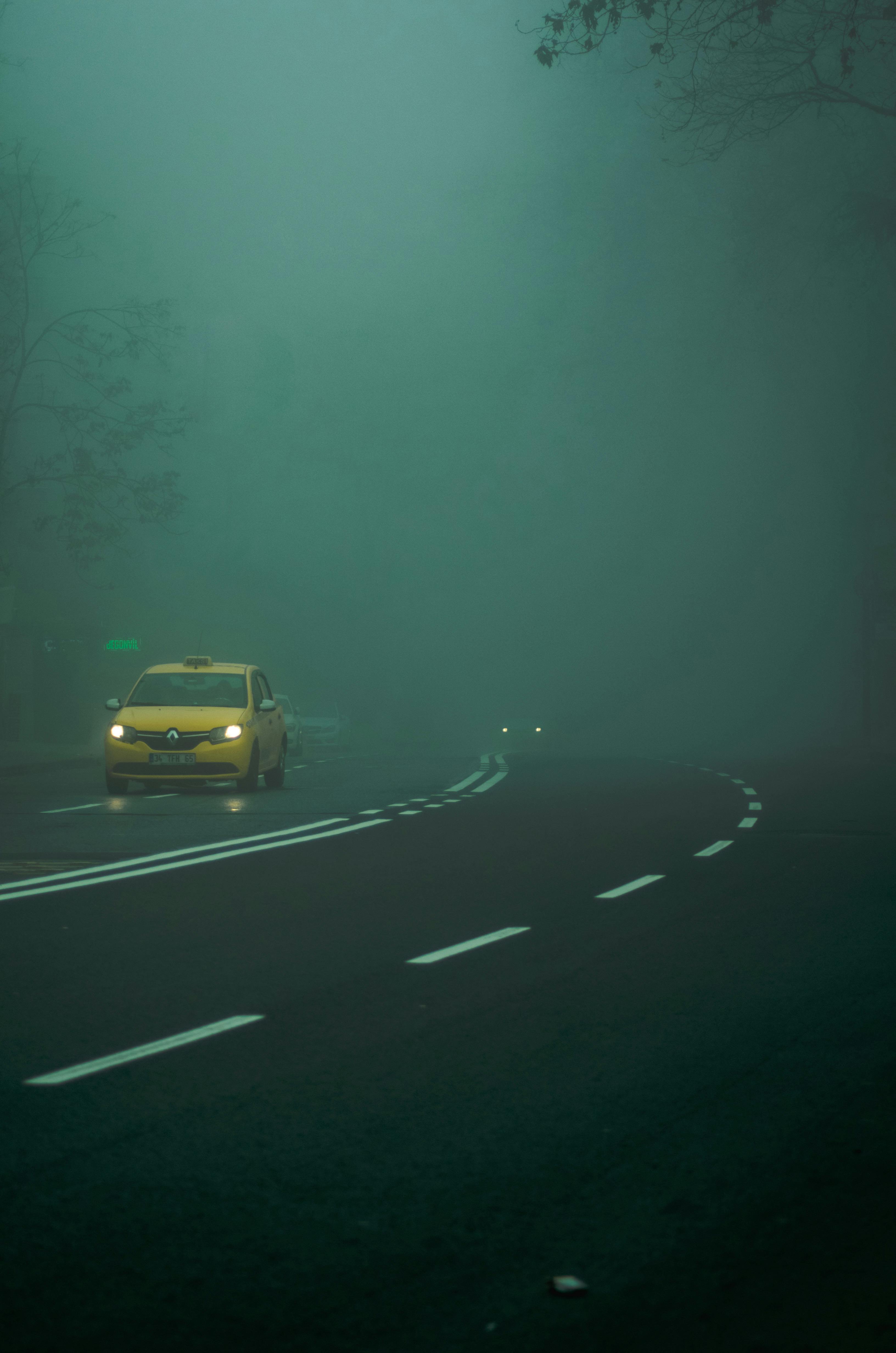 Yellow Car on the Road · Free Stock Photo