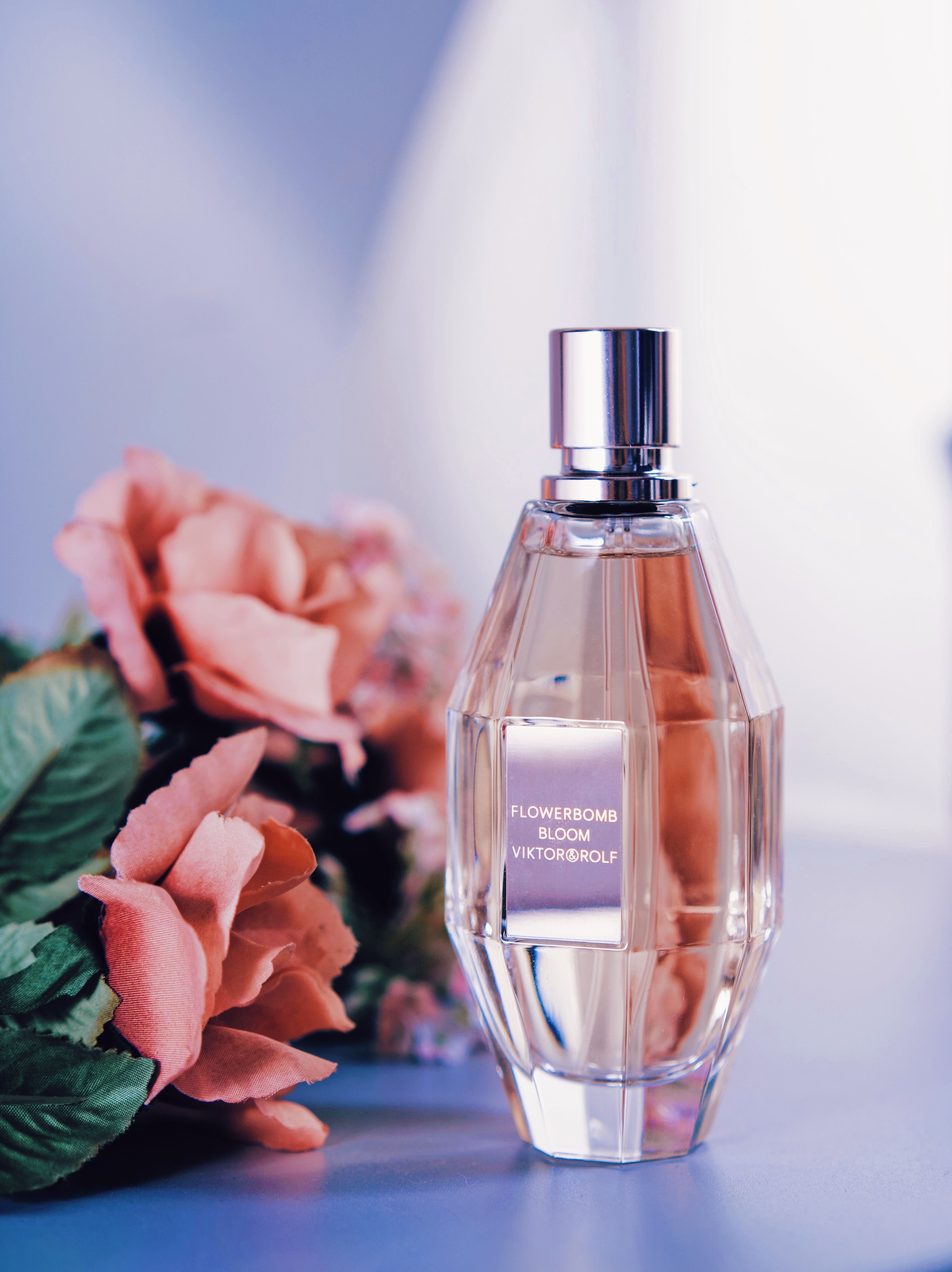 Rose Fragrance in a Glass Bottle · Free Stock Photo