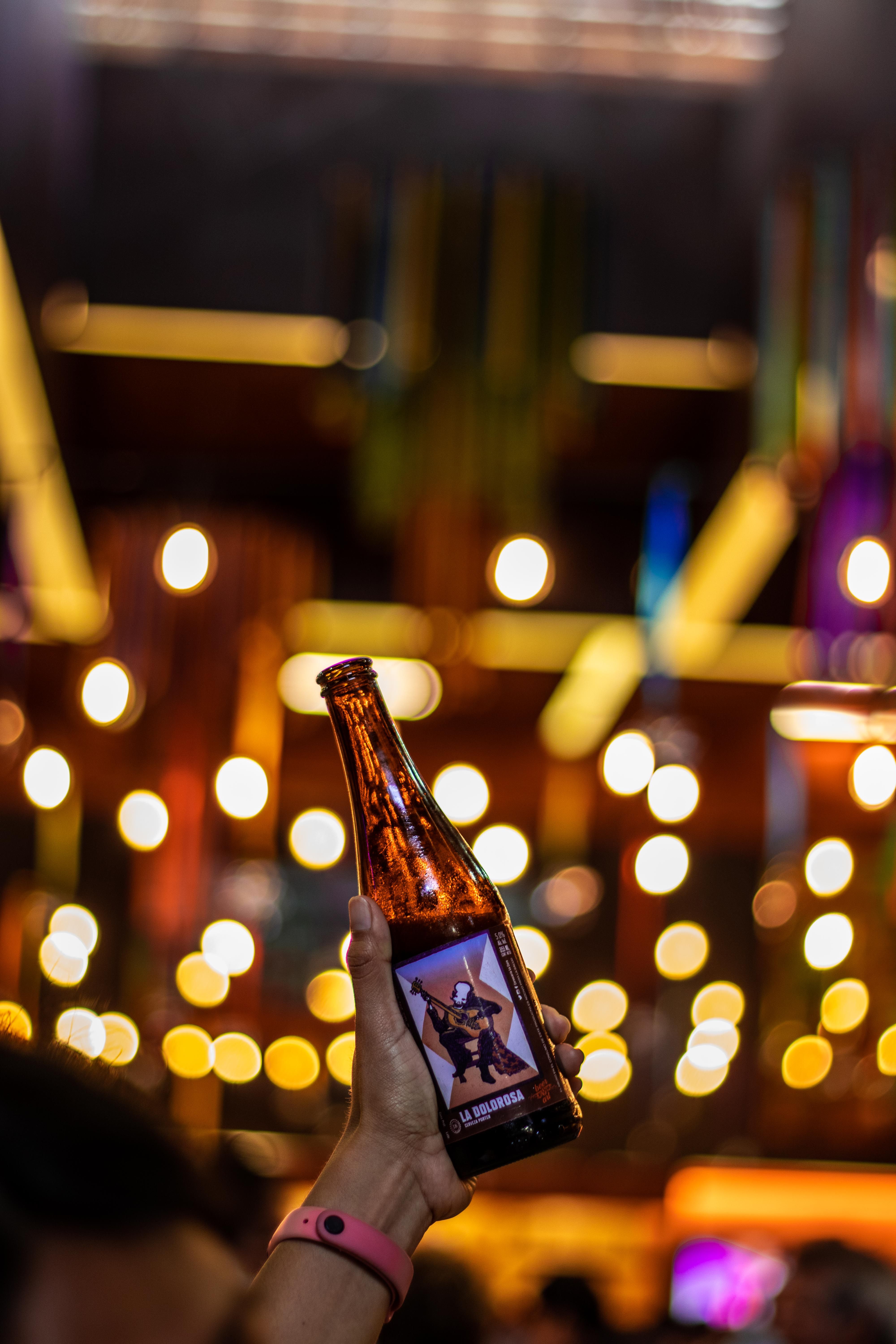 Hand Holding Beer Bottle · Free Stock Photo