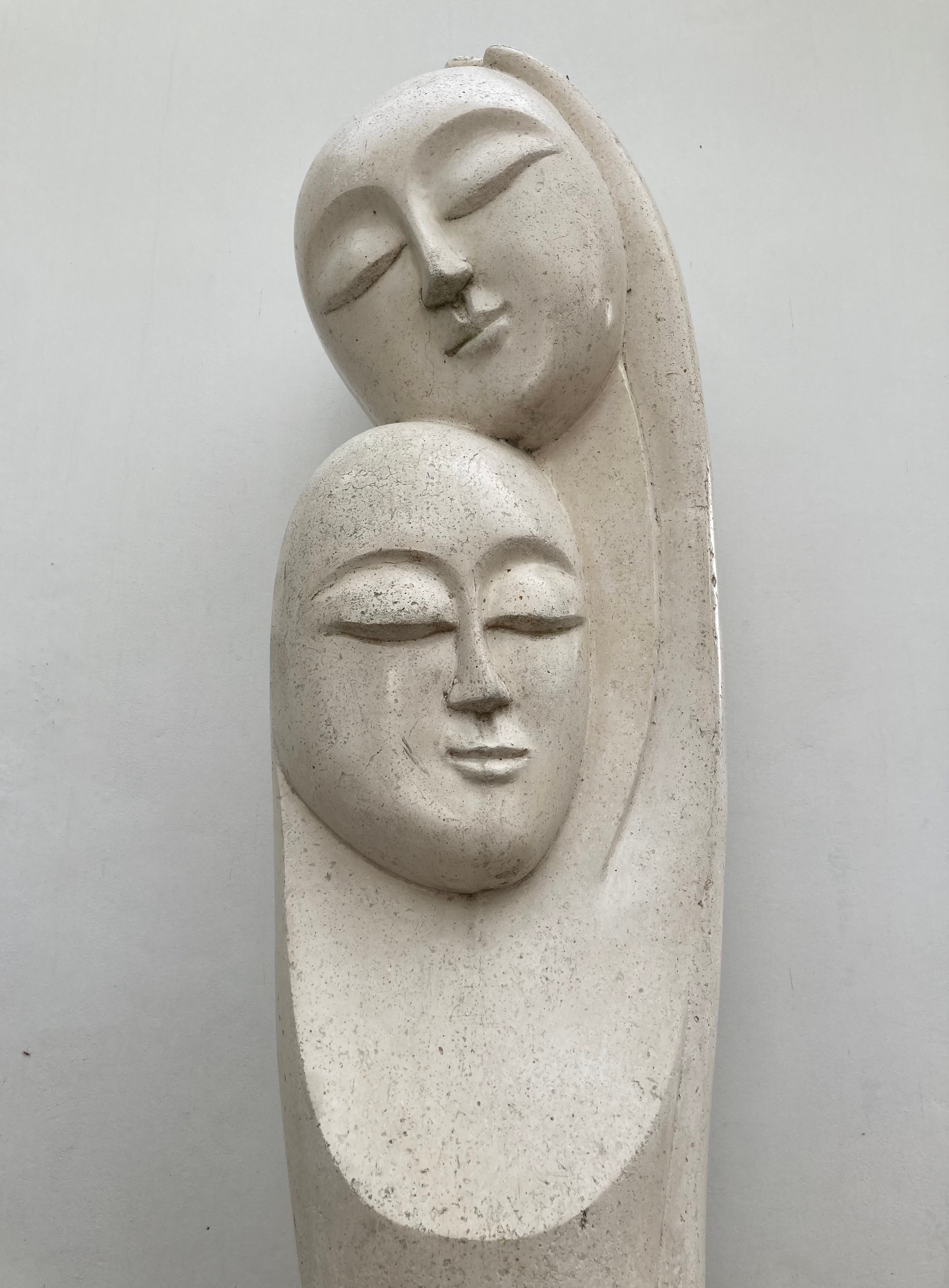 Sculpture of Faces · Free Stock Photo