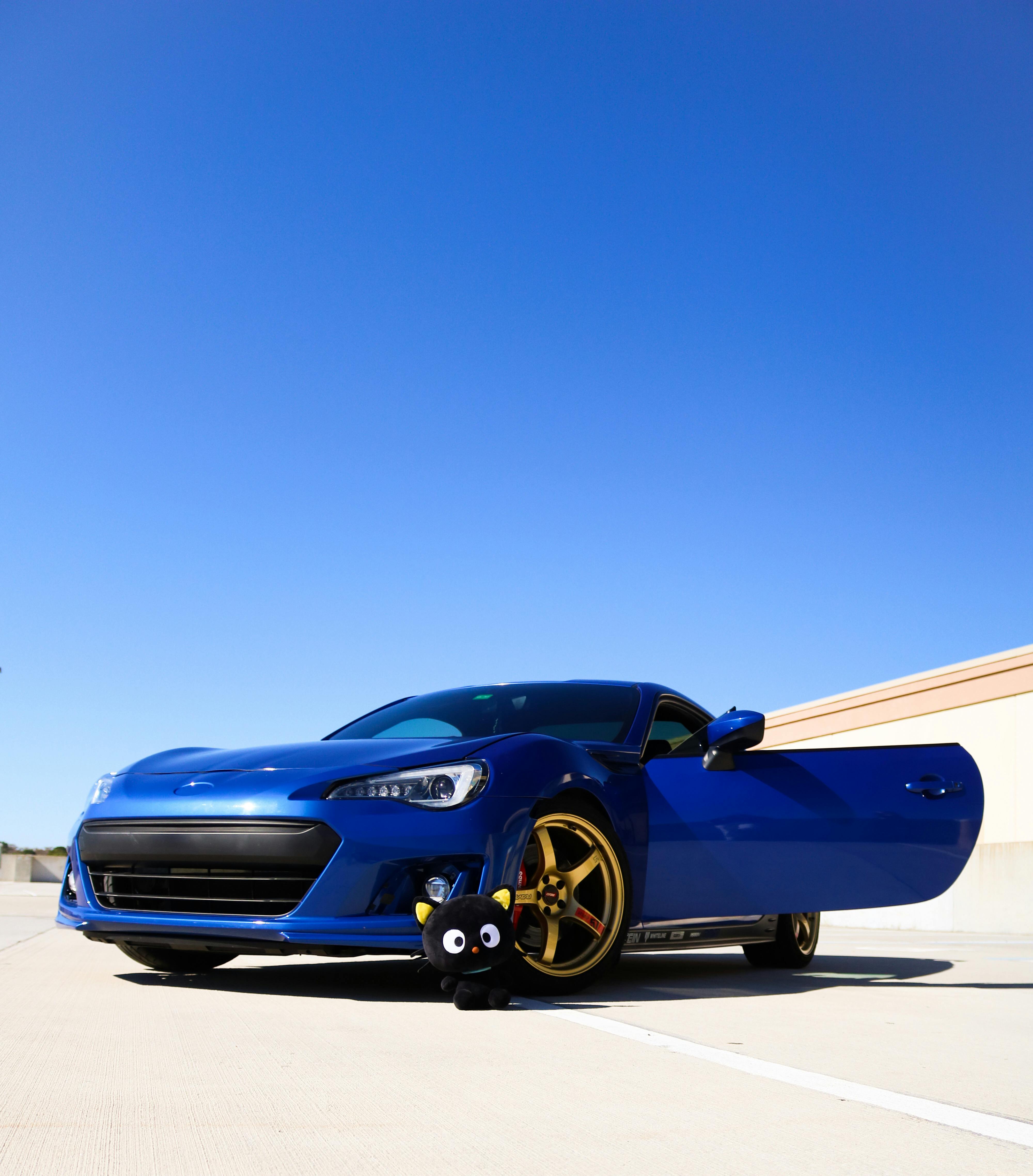 Blue Sports Car with Open Hood · Free Stock Photo