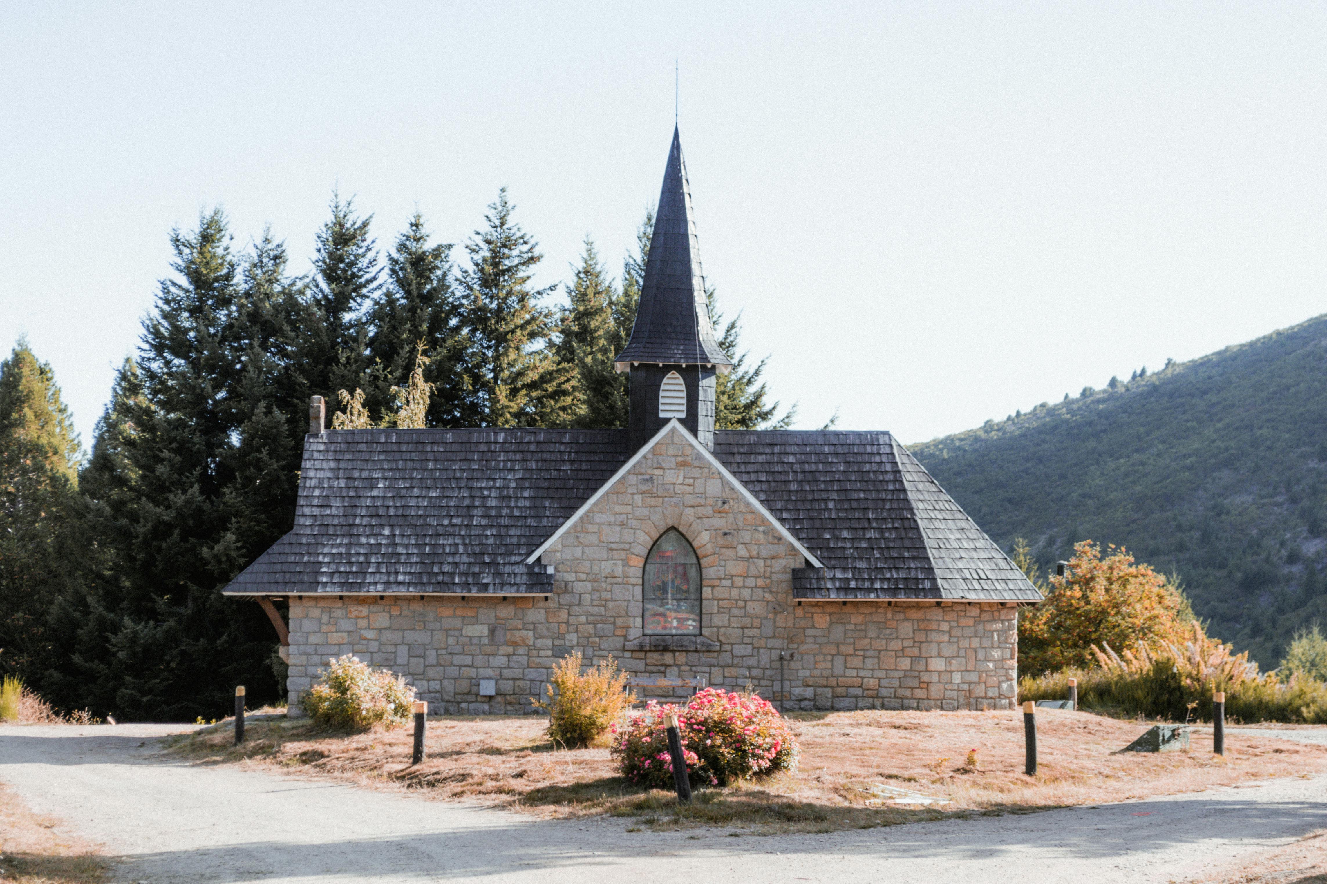 Old Stone Church in Mountains Landscape · Free Stock Photo