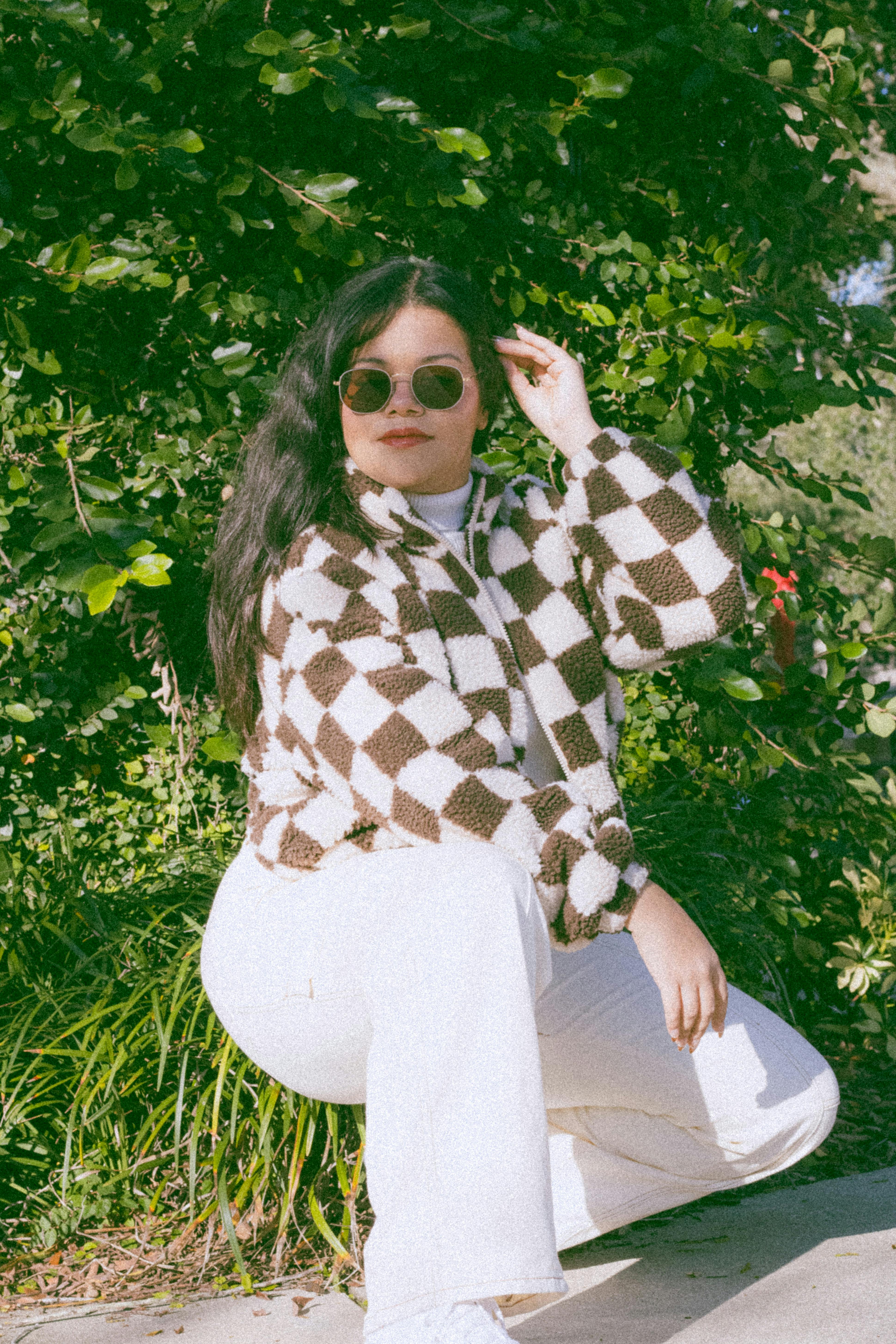 A Woman Sitting Beside the Green Tree · Free Stock Photo
