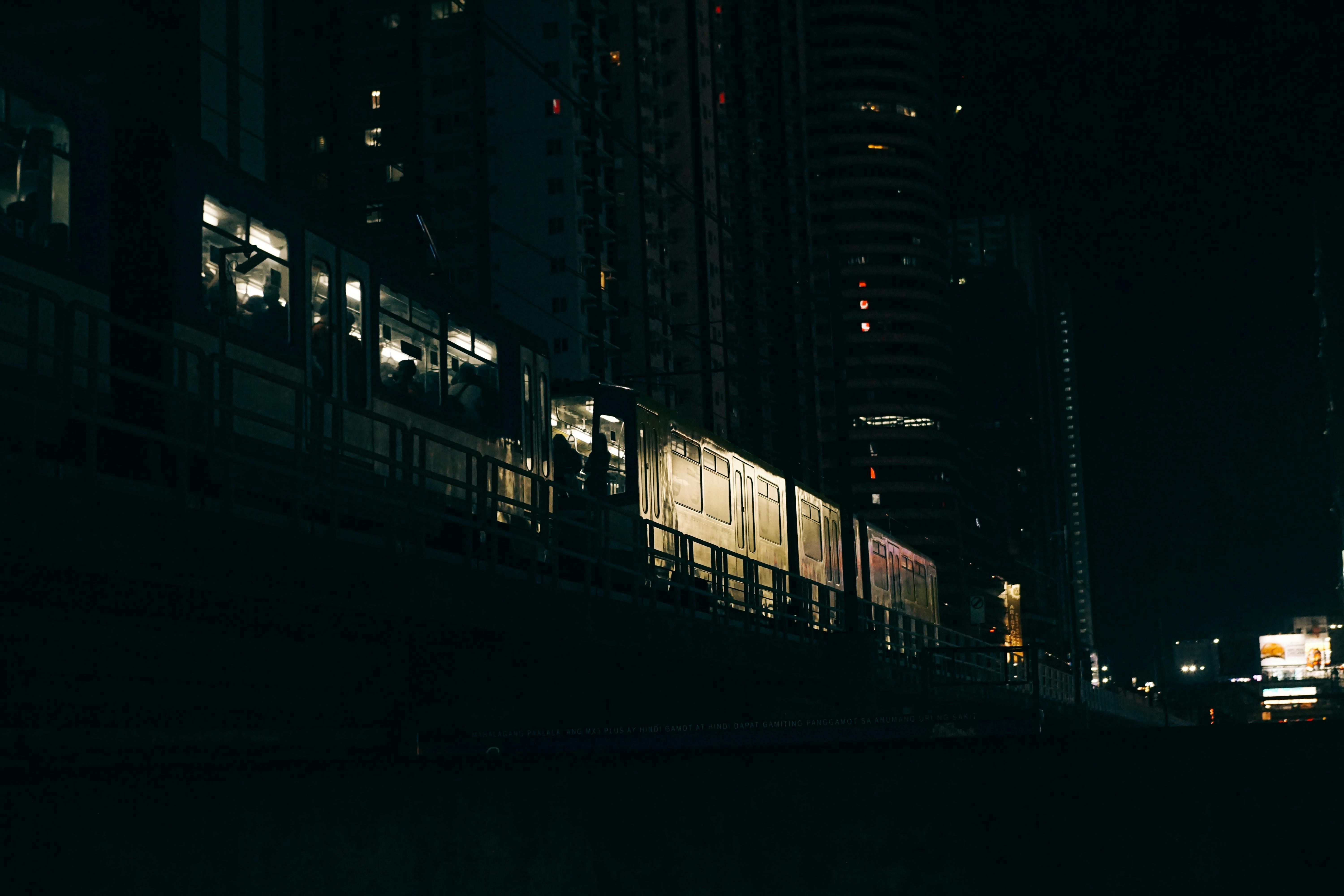 Photo of Train Traveling during Night Time · Free Stock Photo