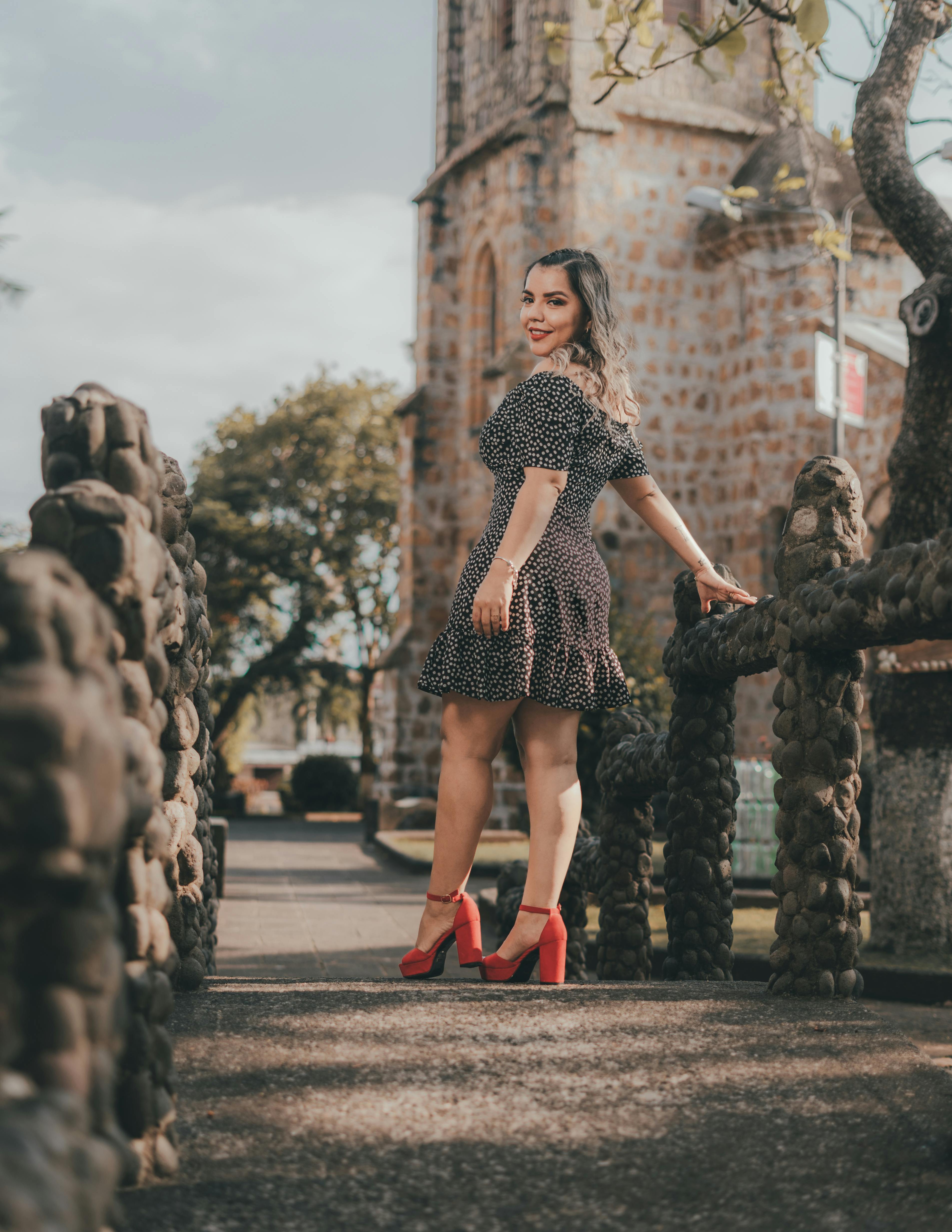 Woman Posing in front of Church · Free Stock Photo