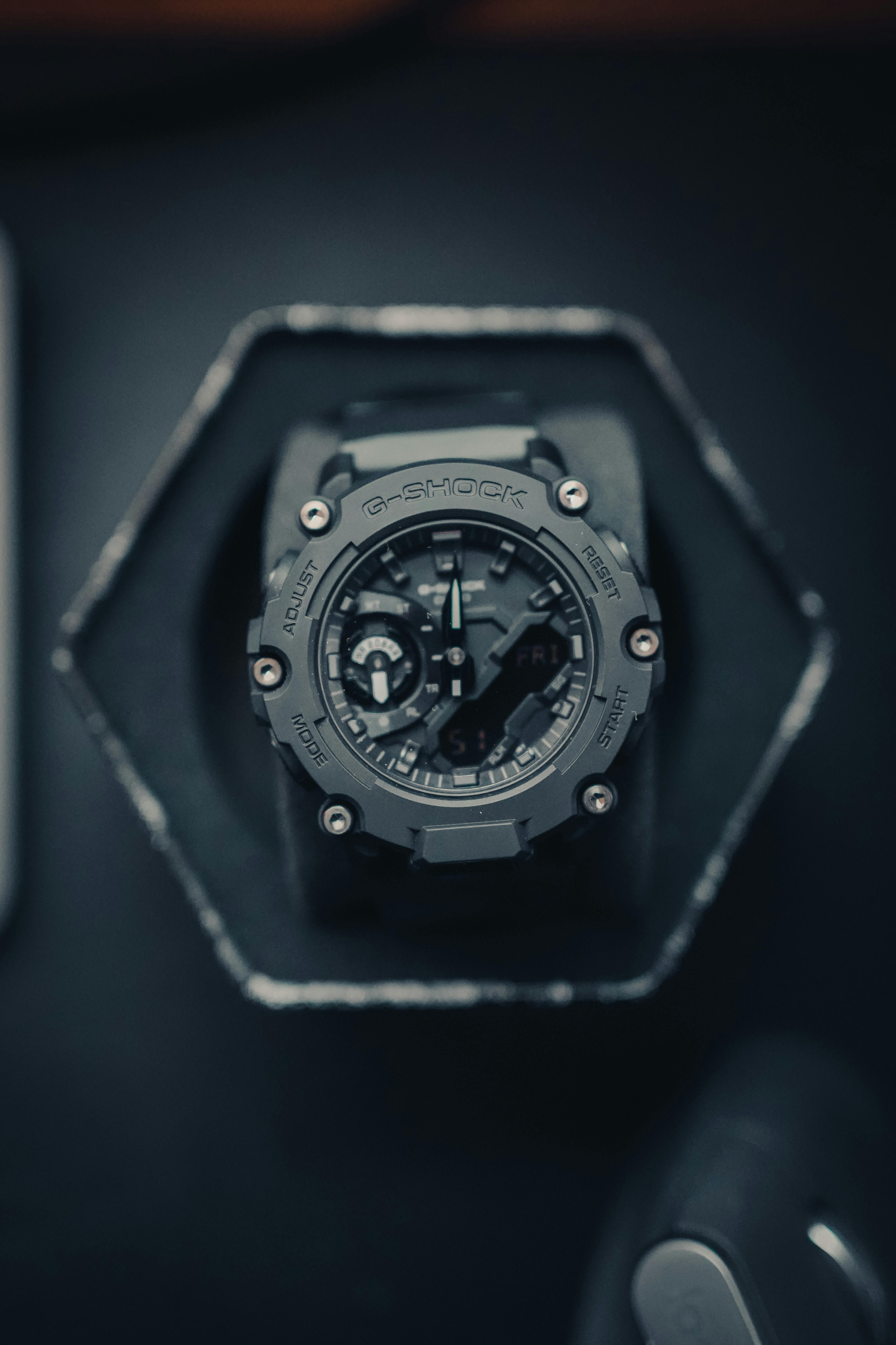Modern Wristwatch on Black Studio Background · Free Stock Photo
