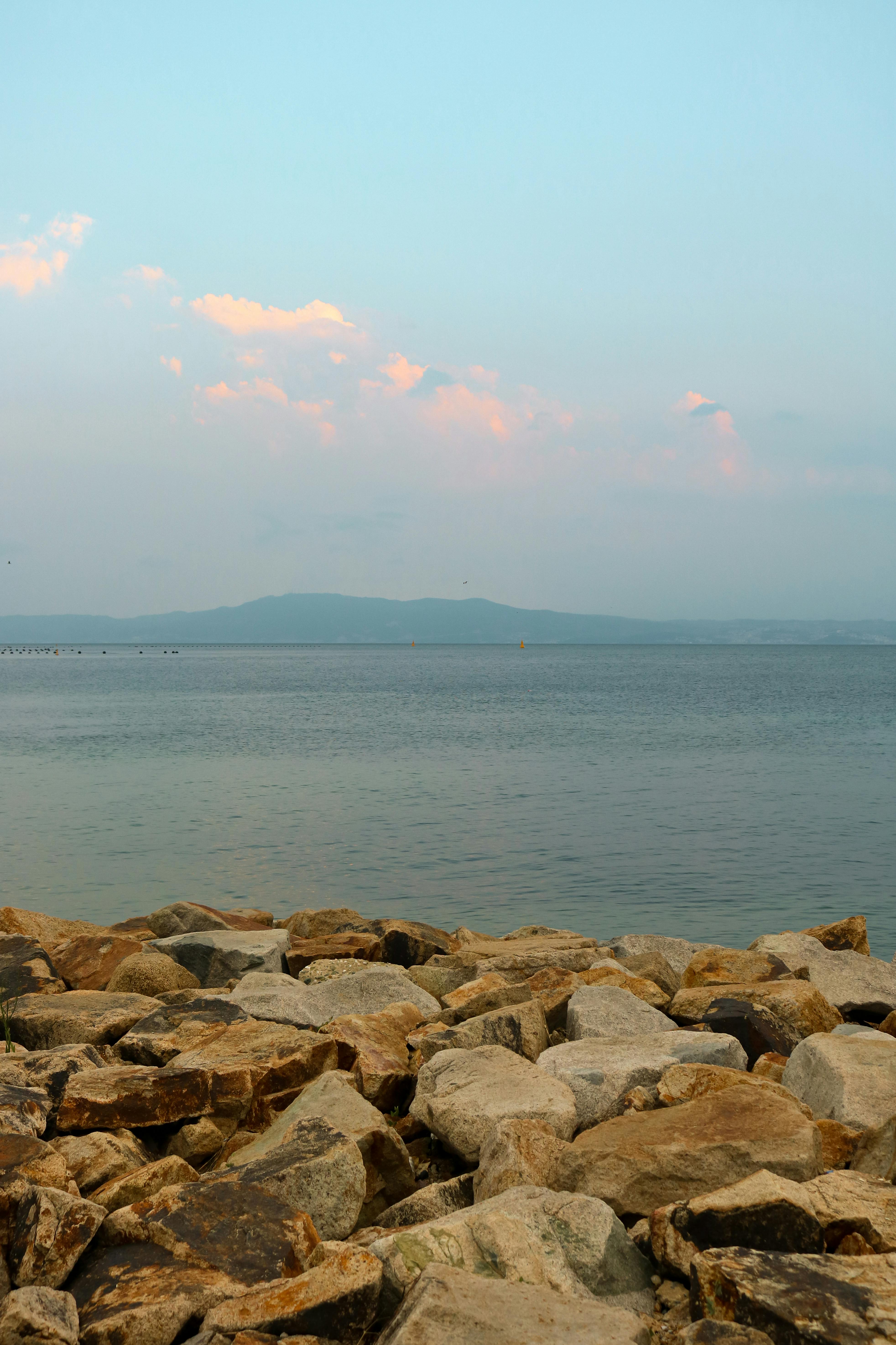 Photograph of Rocks near an Ocean · Free Stock Photo