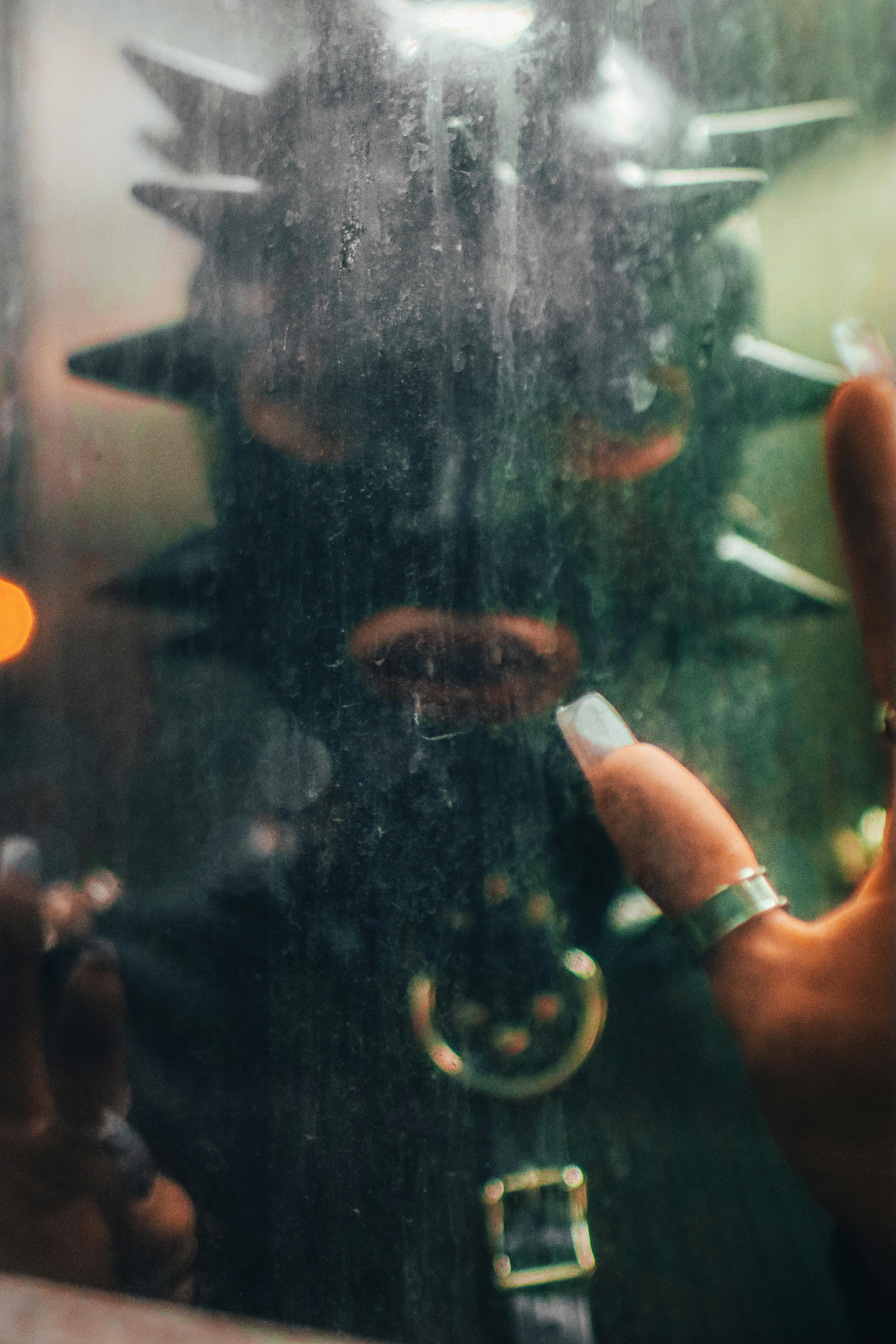 Mask with Thorns on Face behind Glass · Free Stock Photo