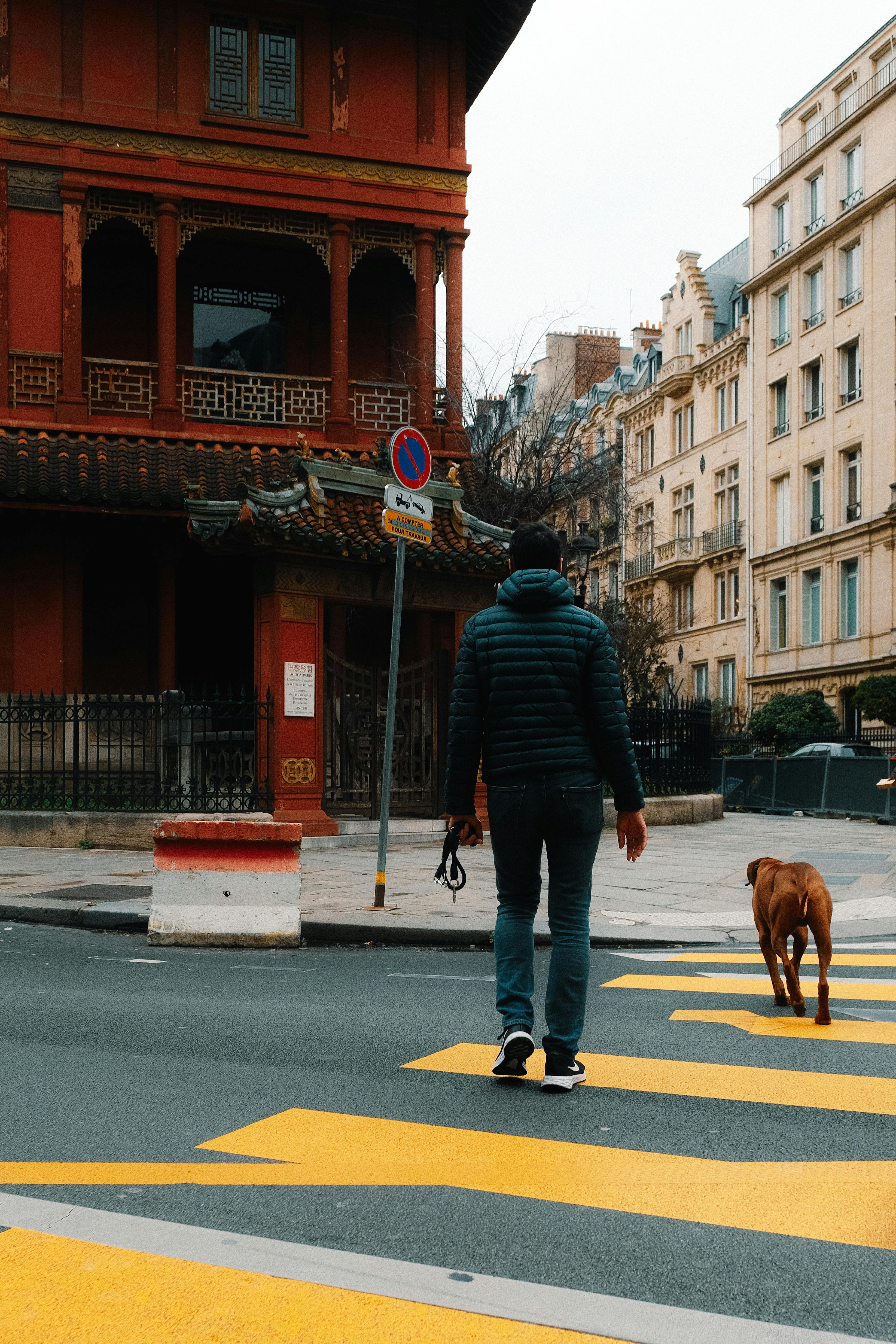 A Man Crossing the Street · Free Stock Photo