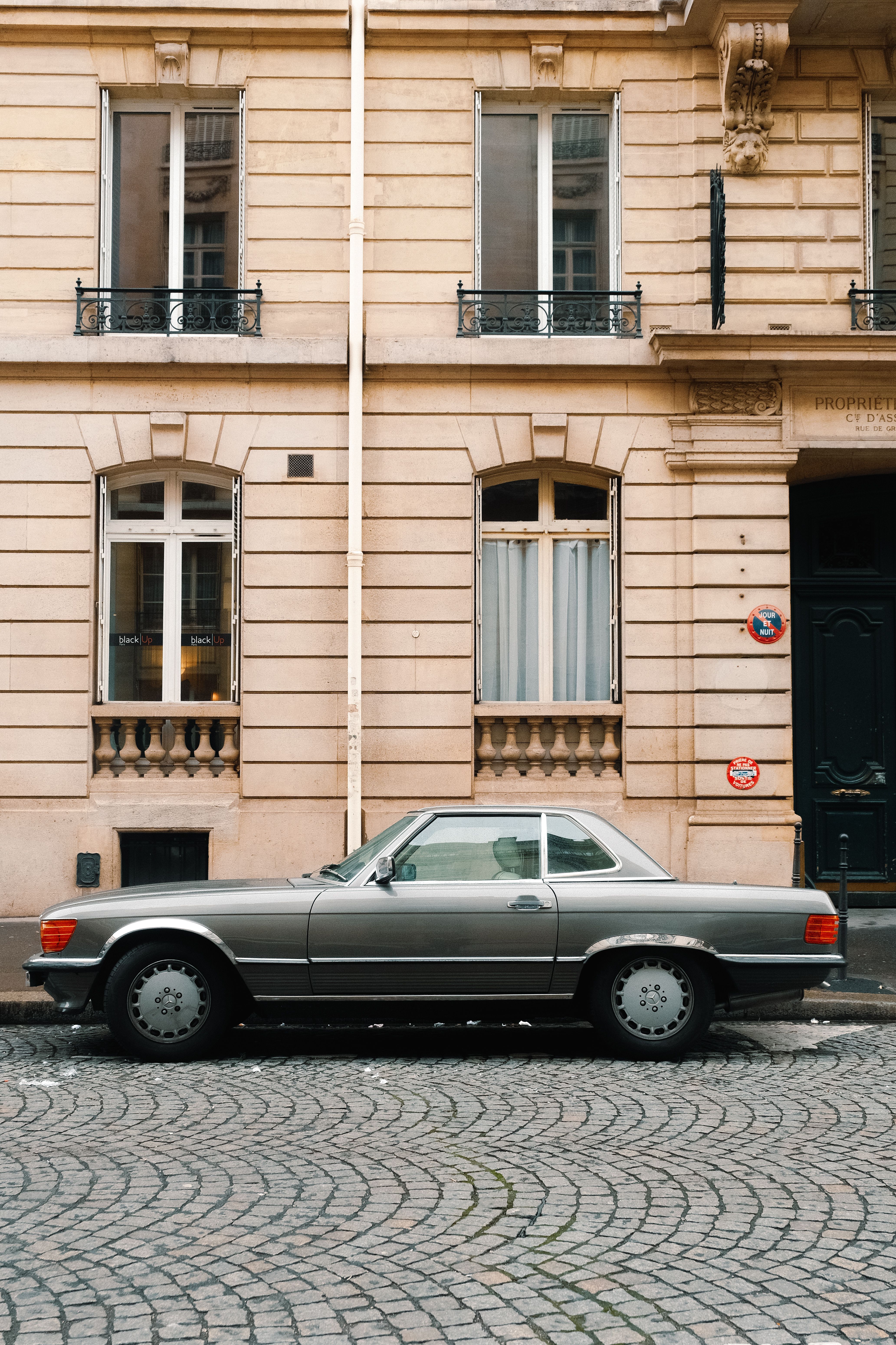 Vintage Car Parked near Building · Free Stock Photo