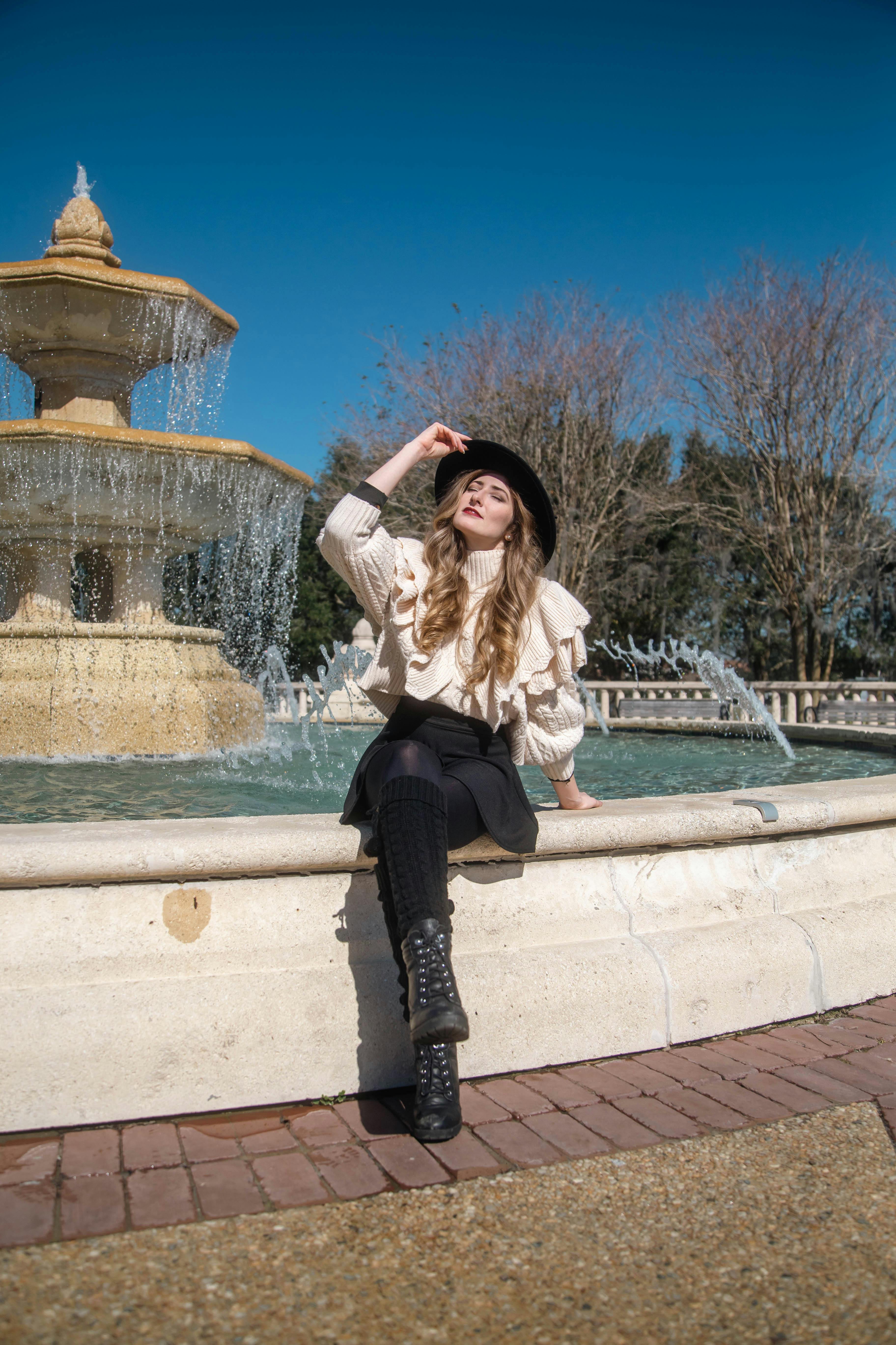 Model in Mini Posing by Fountain · Free Stock Photo