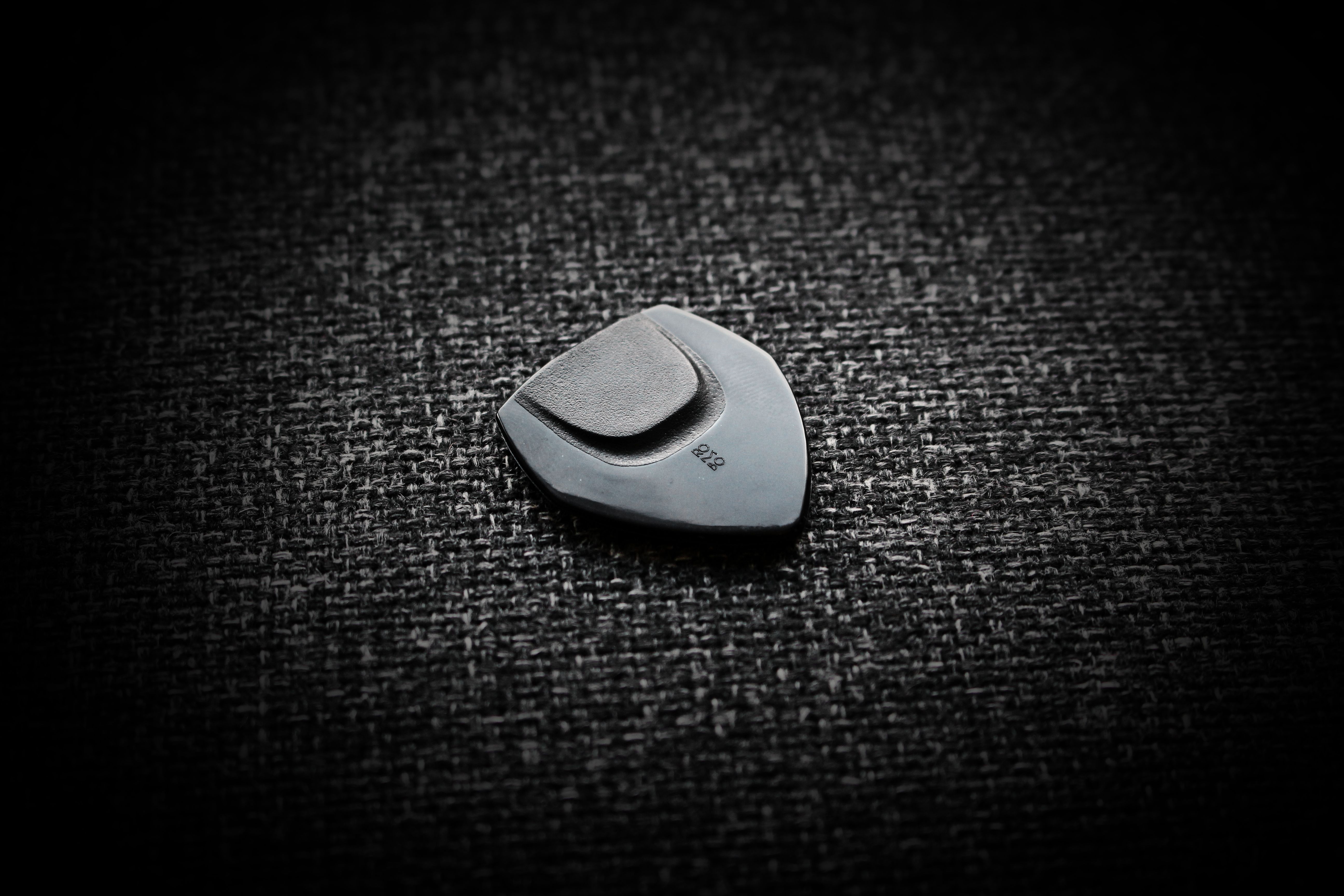Close-Up Shot of a Guitar Pick · Free Stock Photo