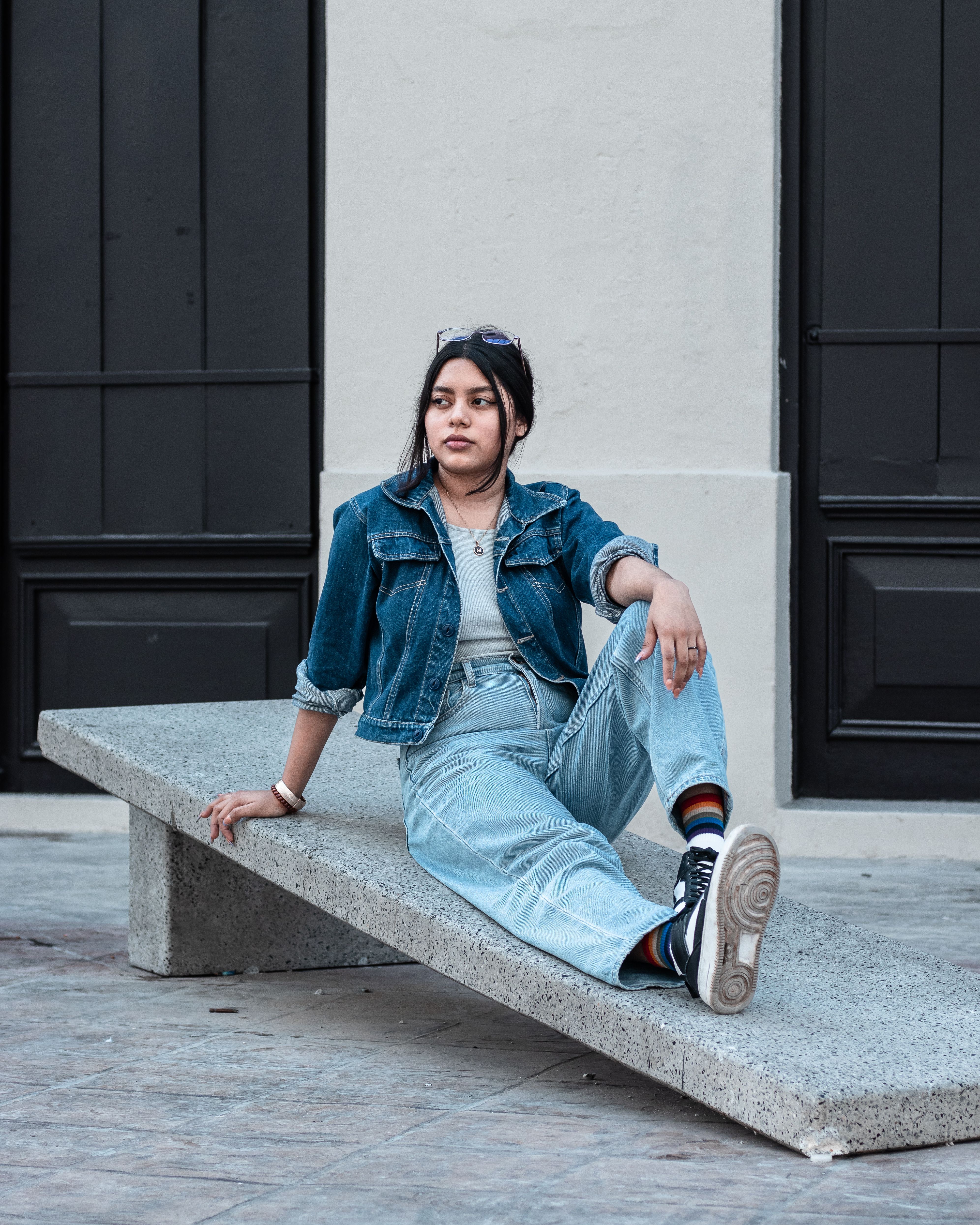 Portrait of a Woman Sitting on a Bench · Free Stock Photo