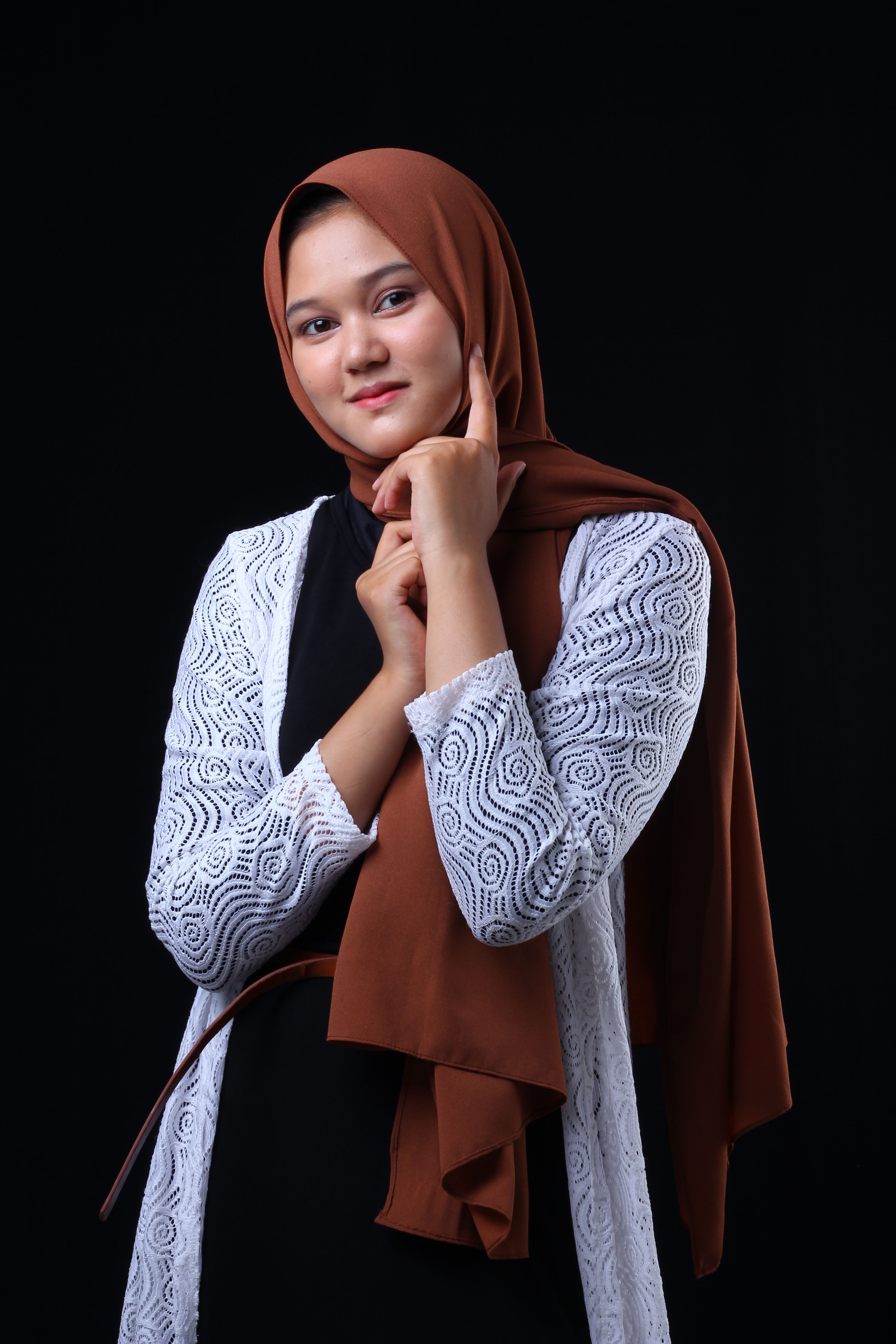 Women Wearing Hijab Holding a Certificate while Posing at the Camera ...