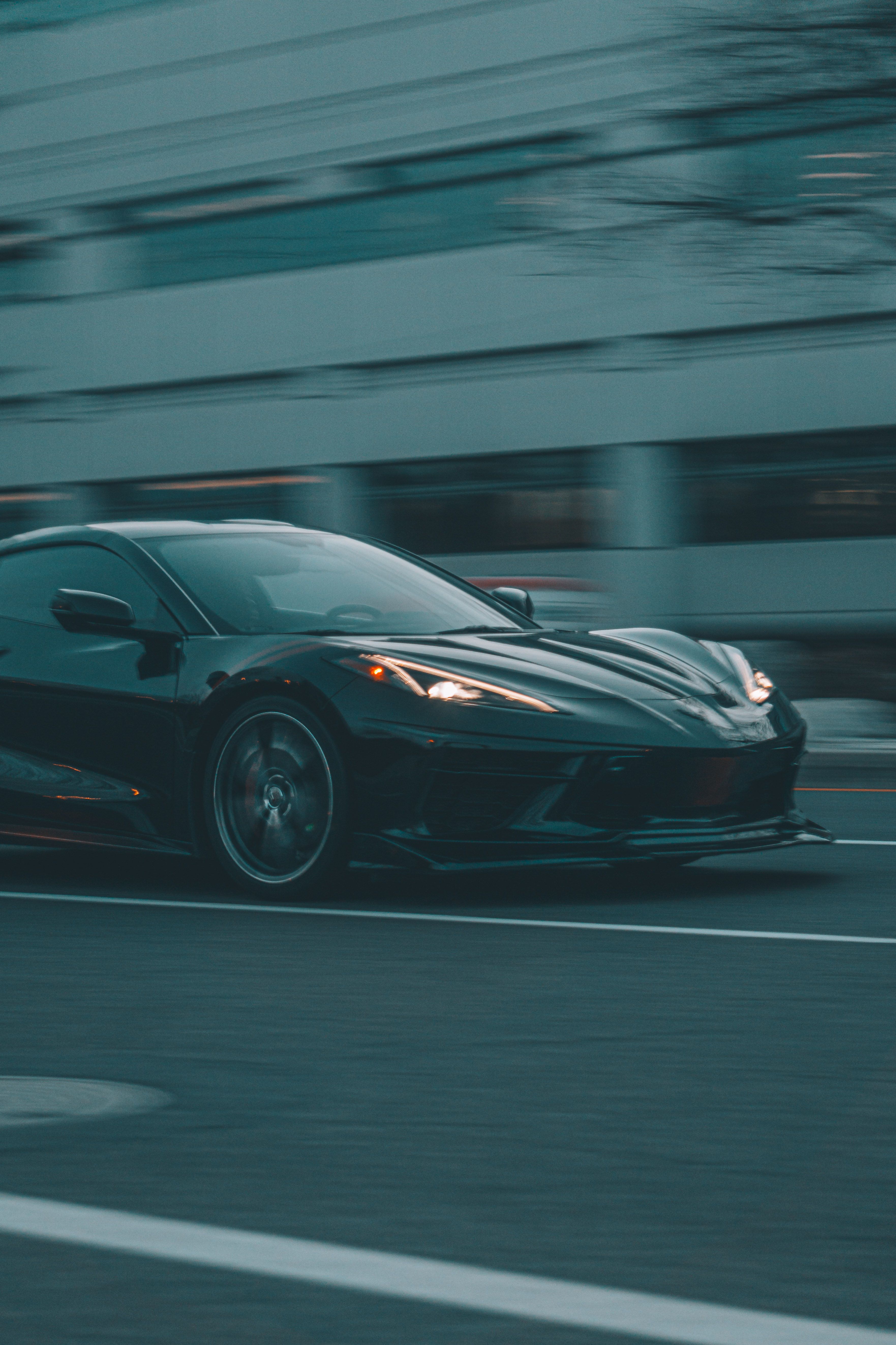 Black Fast Car on a Road · Free Stock Photo