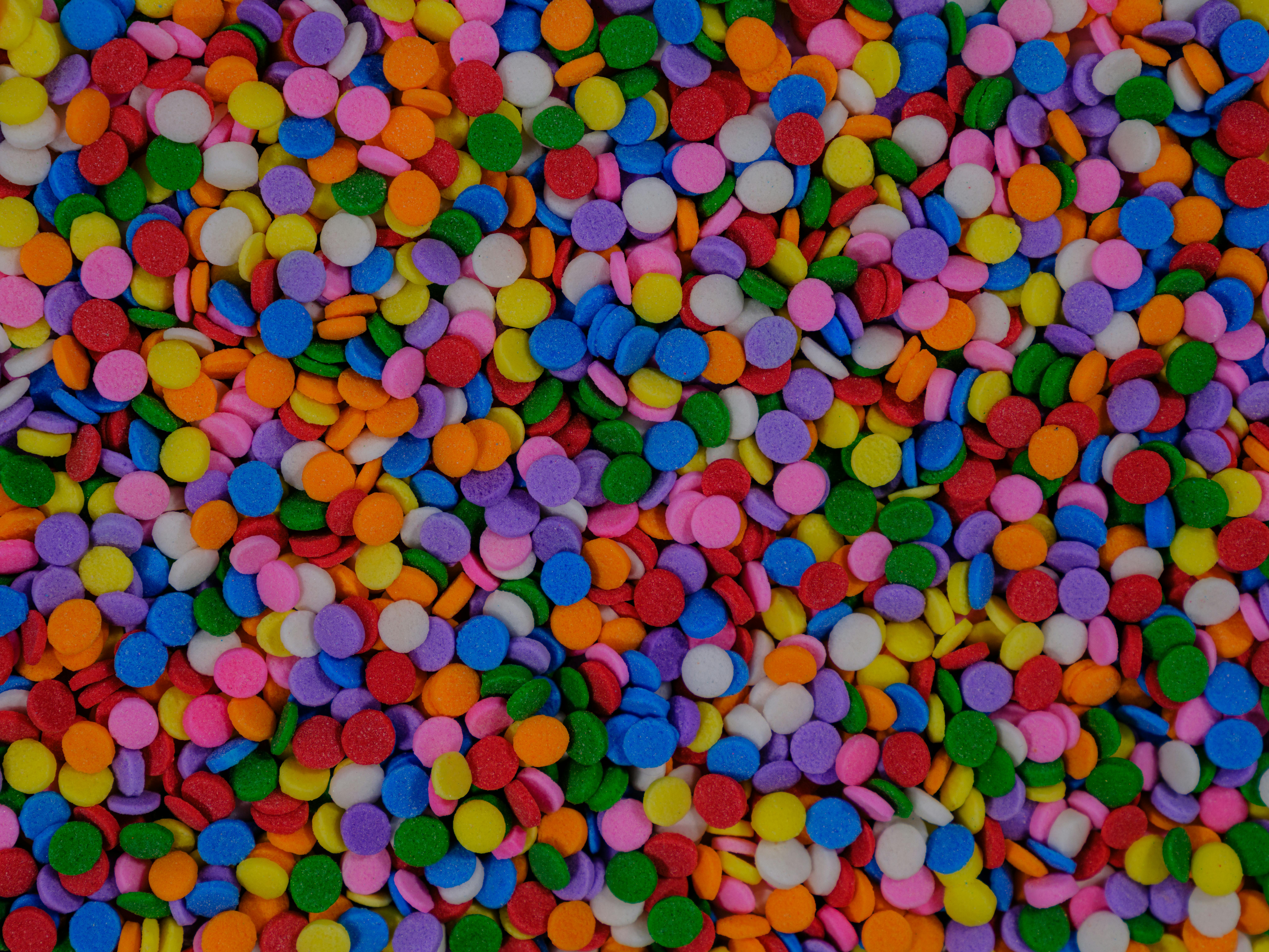Handful of Colorful Candies · Free Stock Photo