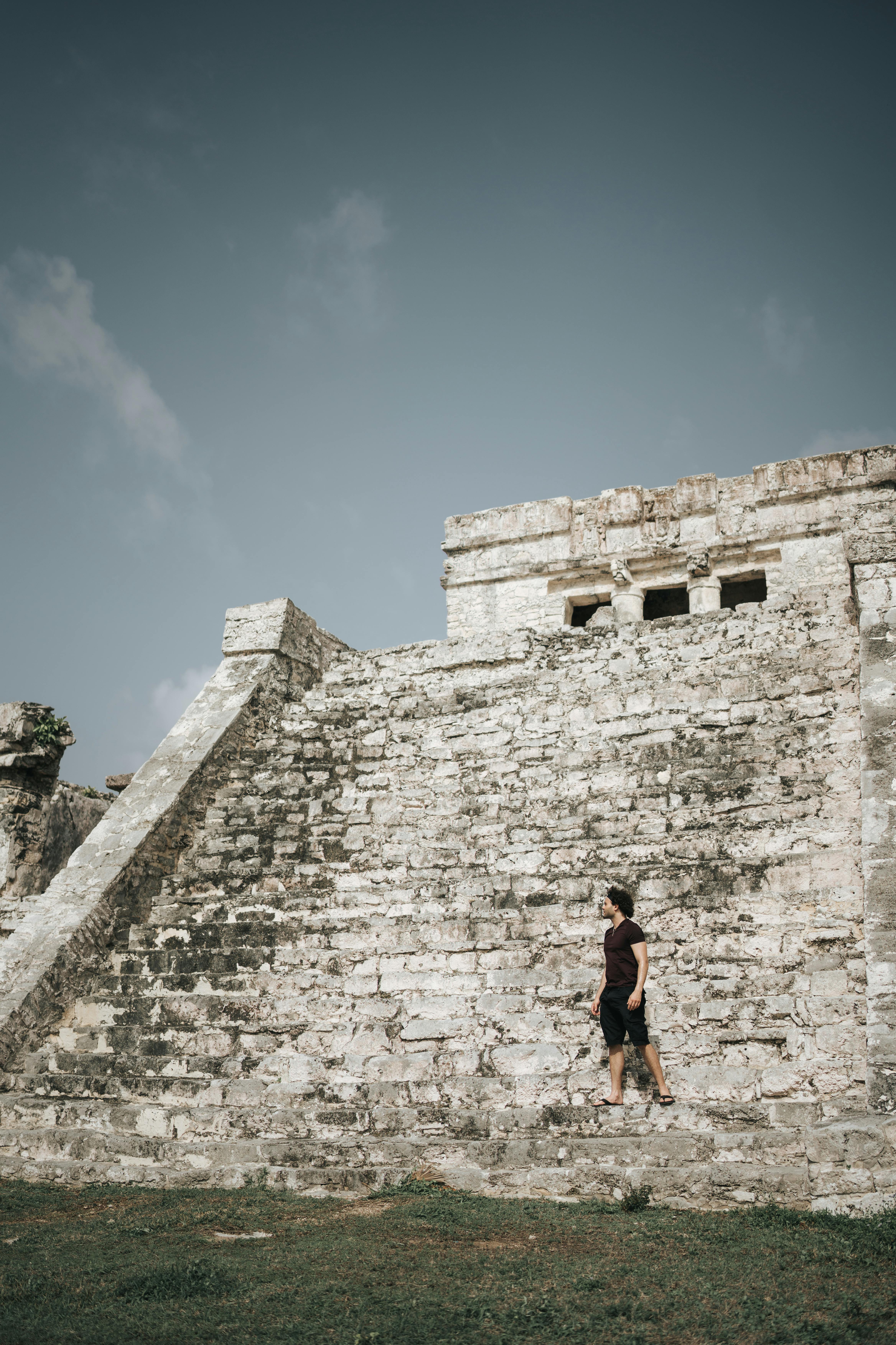 Clear Sky over Person Standing on Pyramid · Free Stock Photo