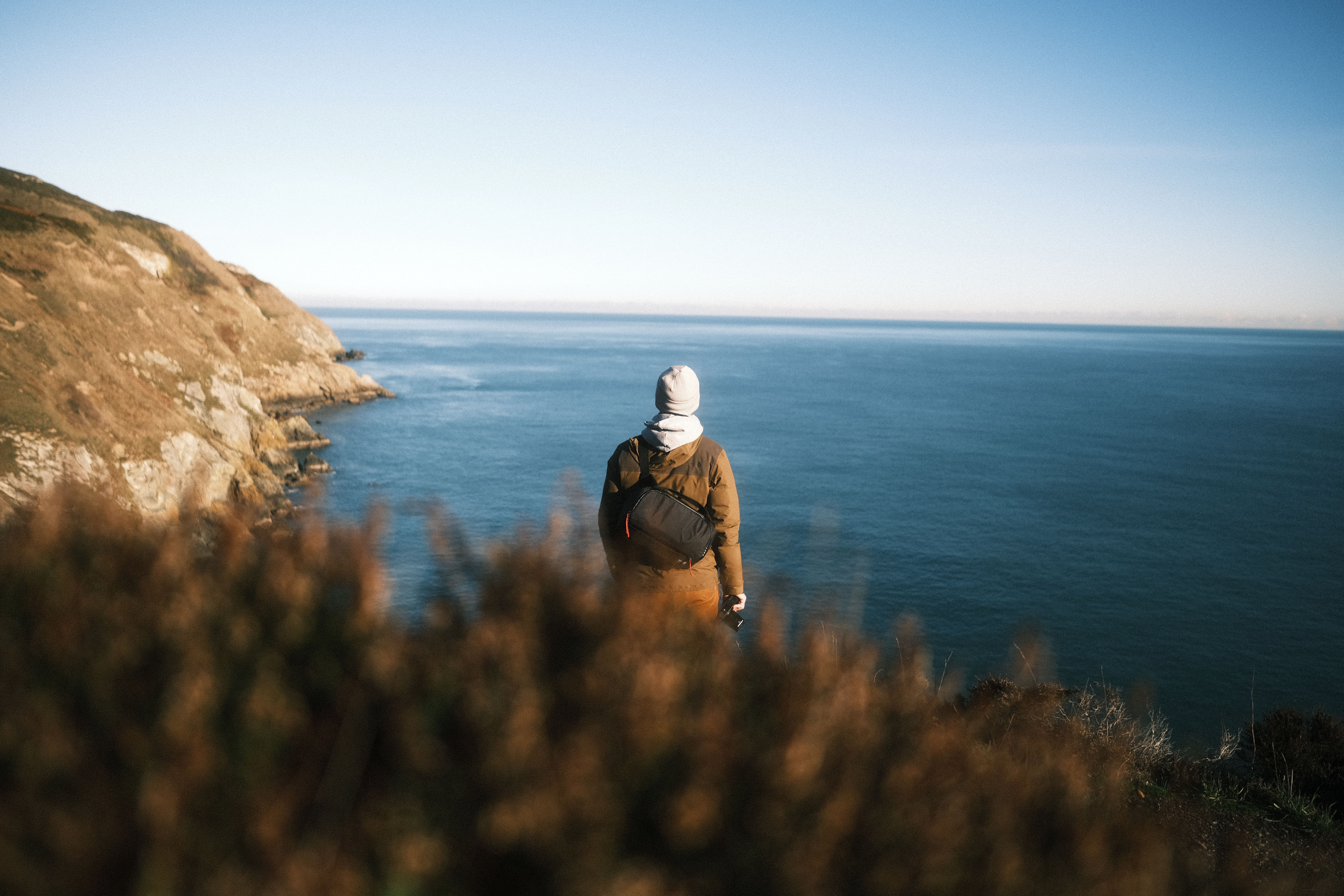 Man Looking at Shore During Sunset · Free Stock Photo