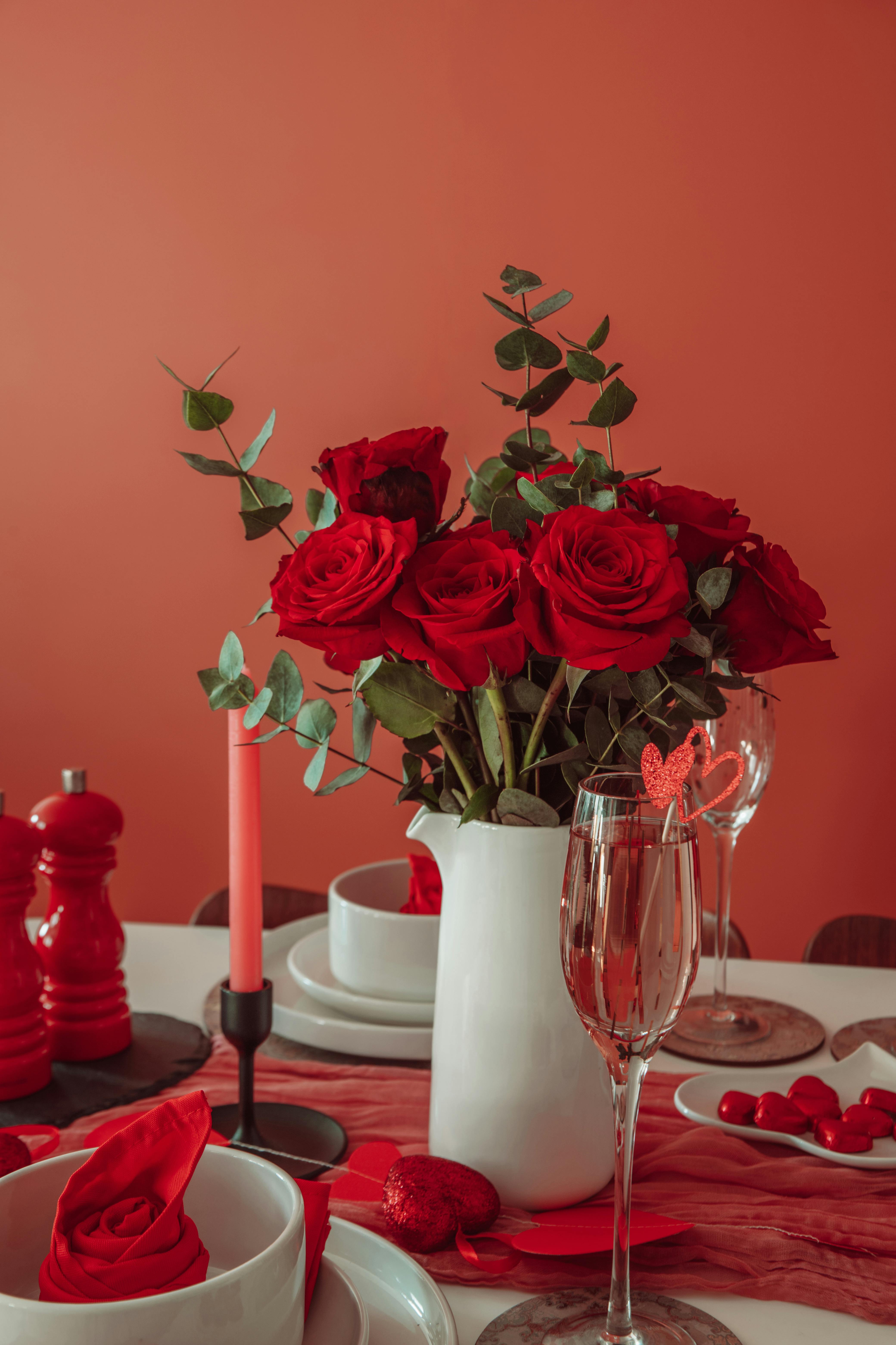 Red Roses and Champagne on Table · Free Stock Photo