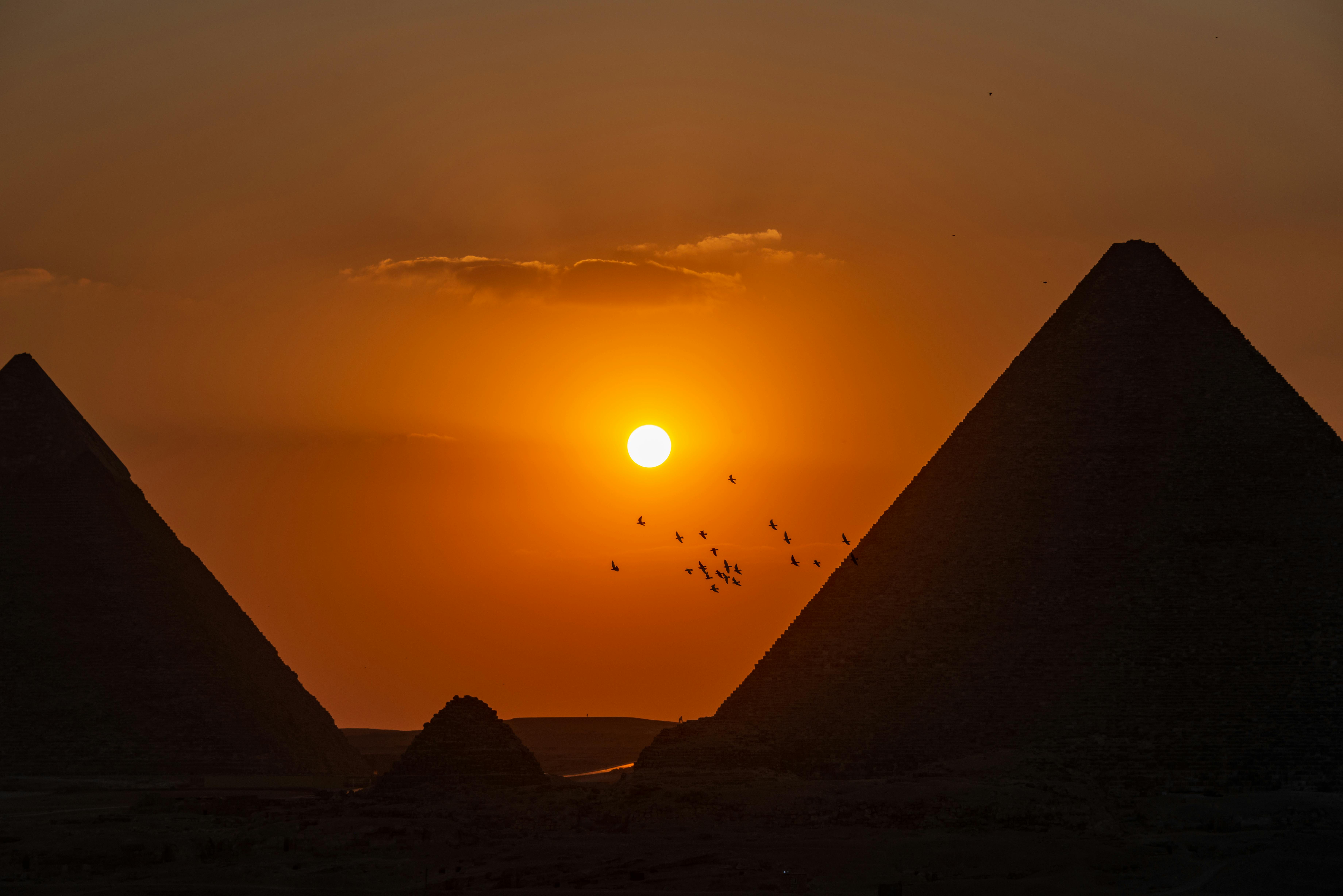 Silhouette of Pyramids during Sunset · Free Stock Photo