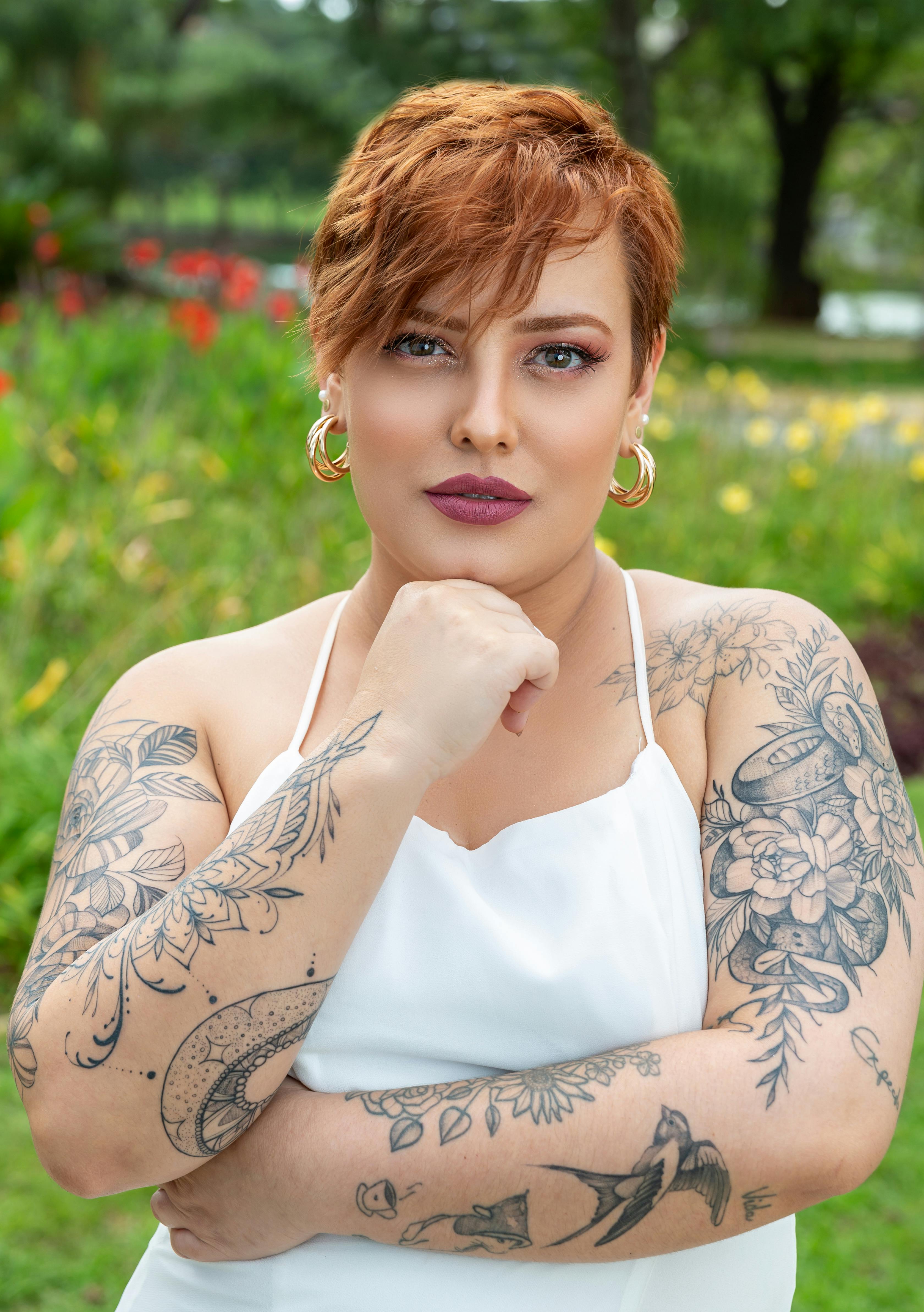 Side View Photo of Girl Standing Near Vanity Mirror · Free Stock Photo