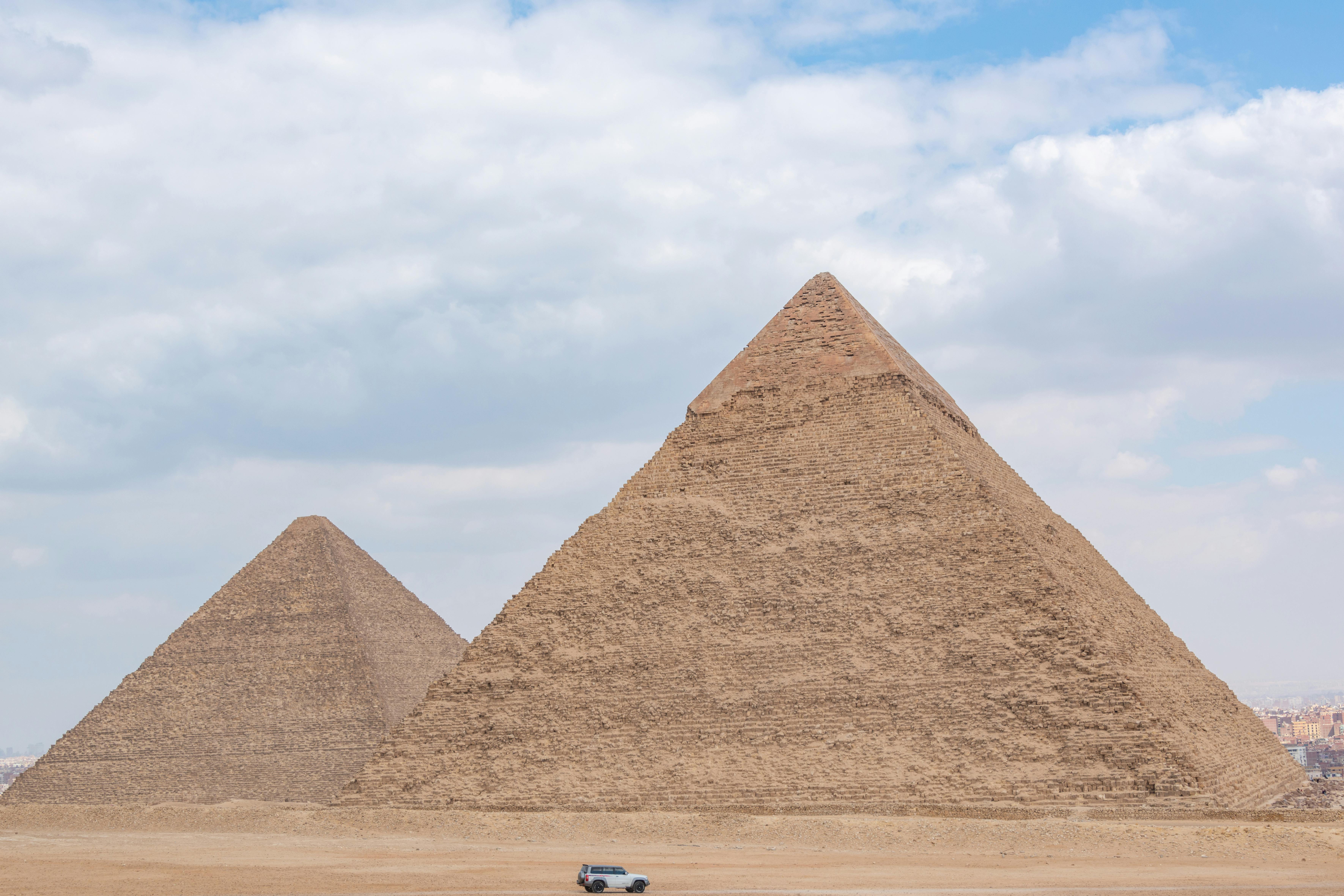 Man Taking Photo of the Great Pyramid · Free Stock Photo