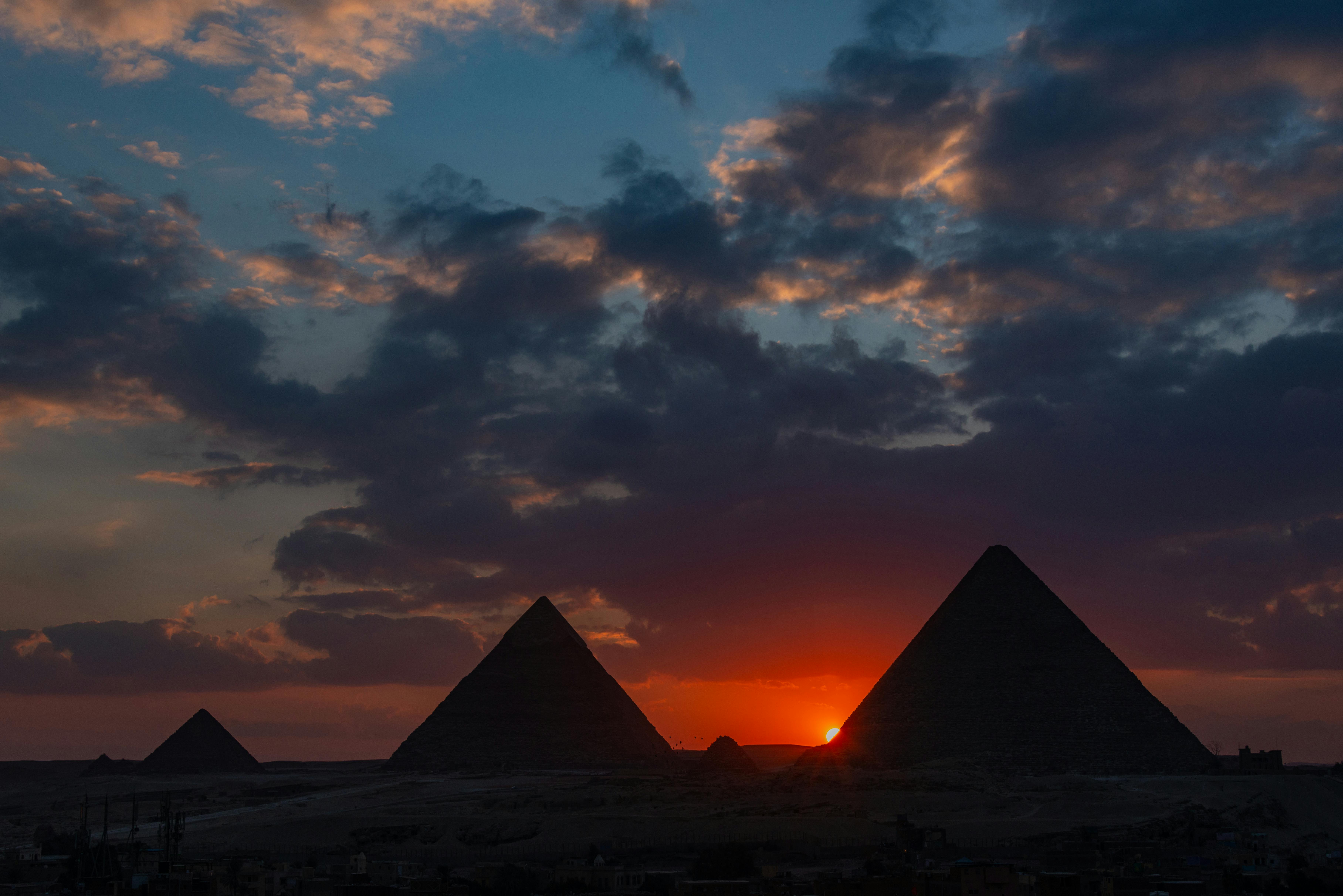 Silhouette of Pyramids during Sunset · Free Stock Photo