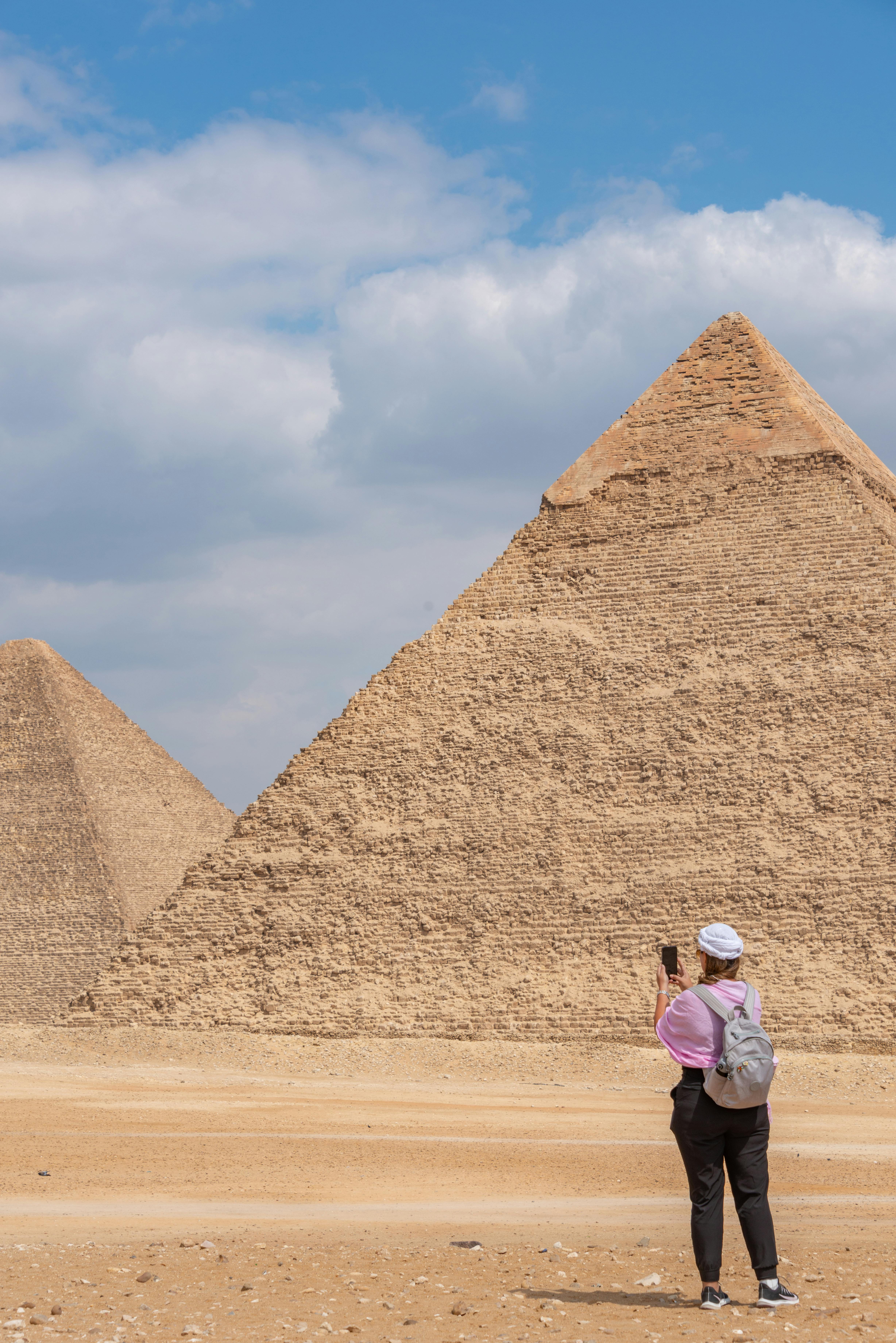 Man Taking Photo of the Great Pyramid · Free Stock Photo