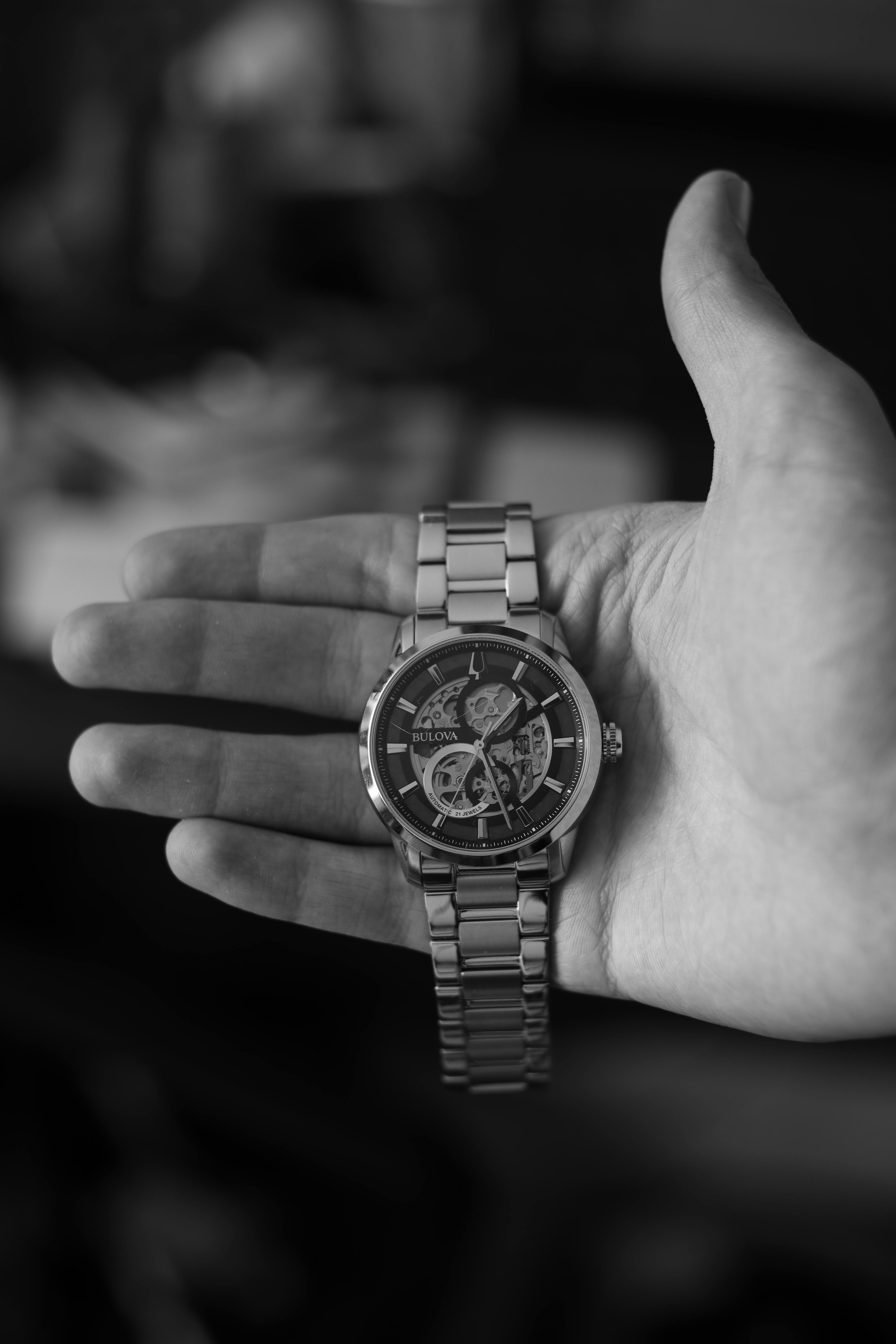 A Person Holding a Wristwatch · Free Stock Photo