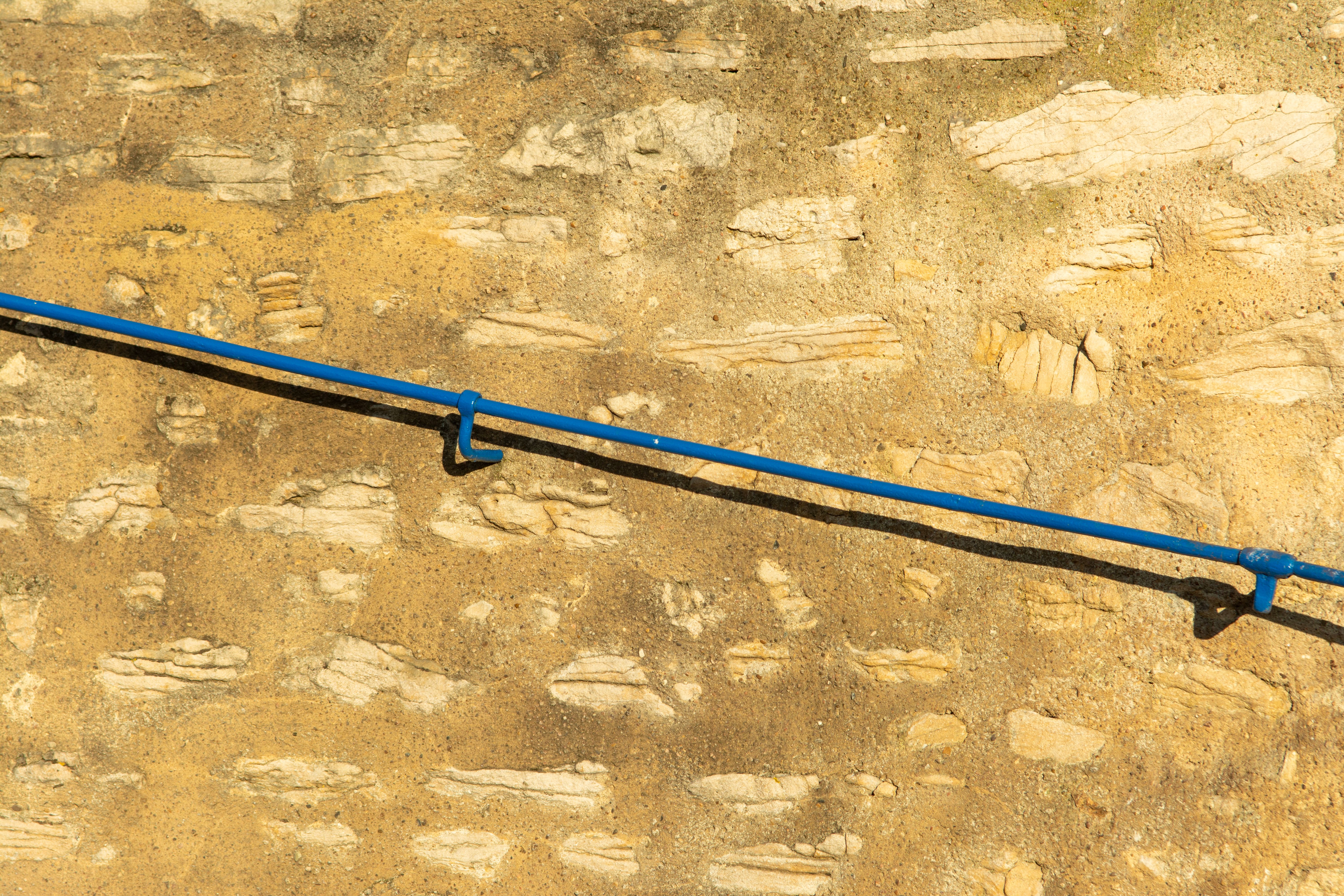 Handrail on Stone Wall · Free Stock Photo
