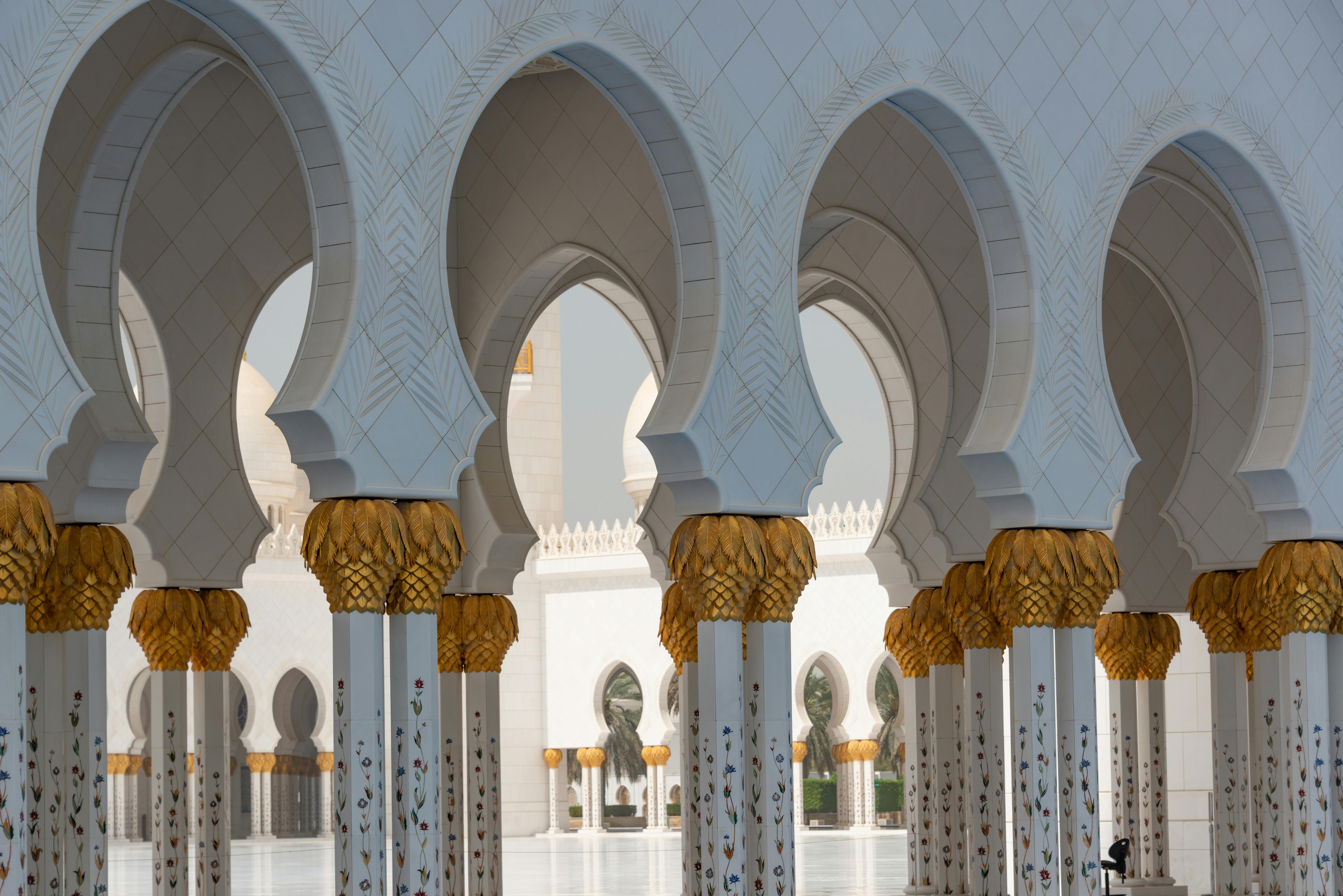 Courtyard and arched passage of medieval mosque · Free Stock Photo