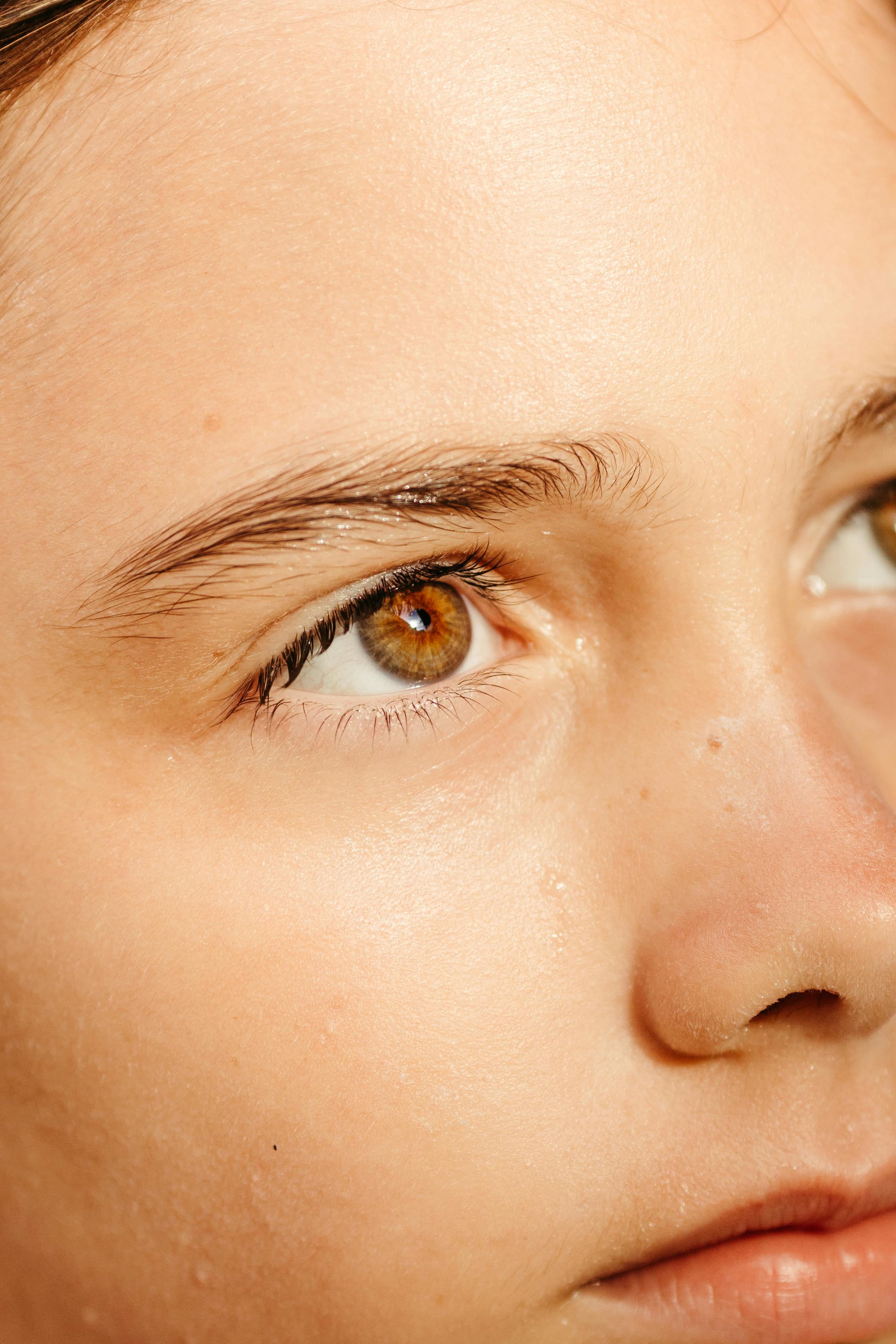 Woman Holding Her Face · Free Stock Photo