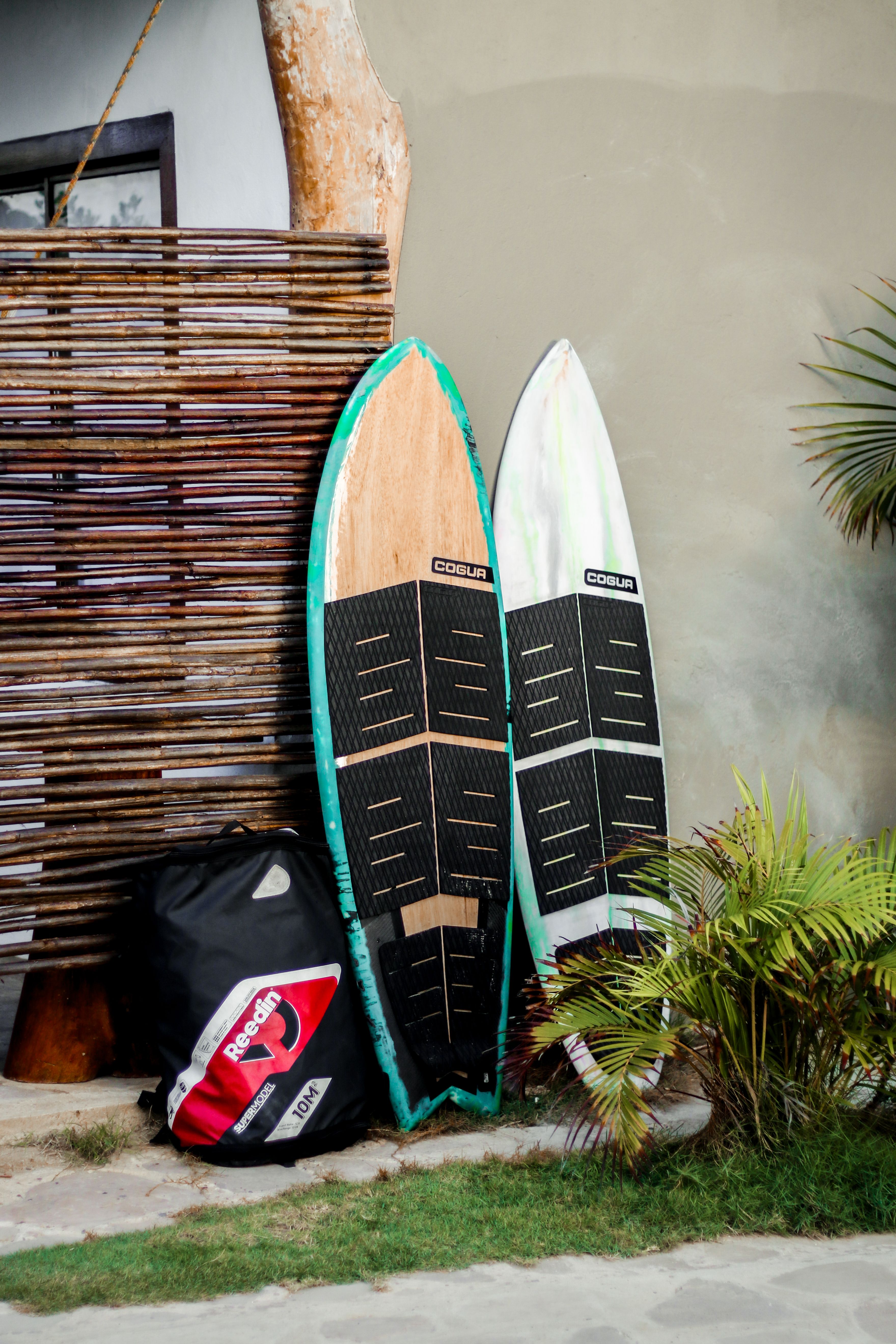 Two Surfboards by a Wall · Free Stock Photo