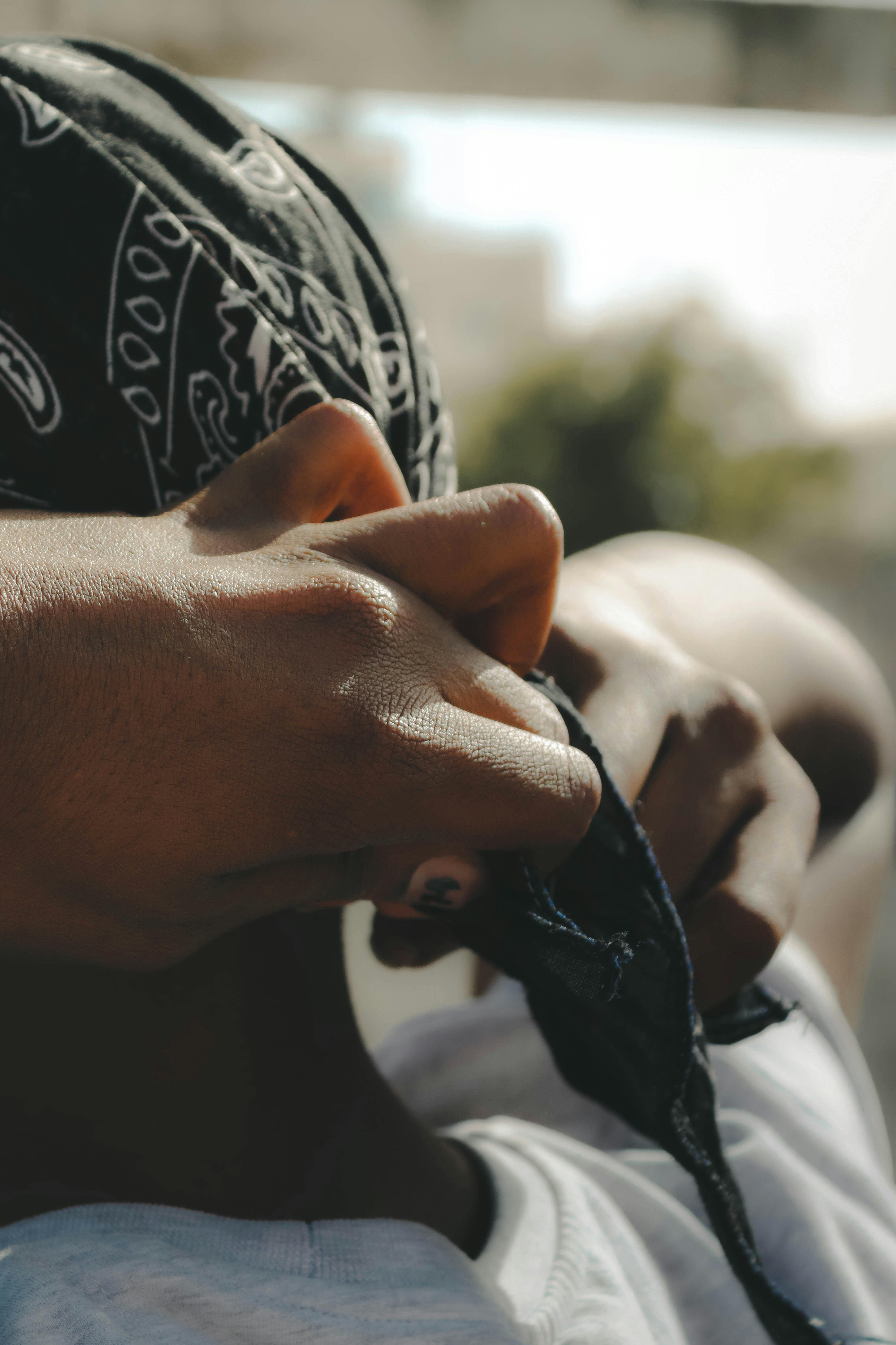 A Close-Up Shot of a Man Wearing a Bandana · Free Stock Photo