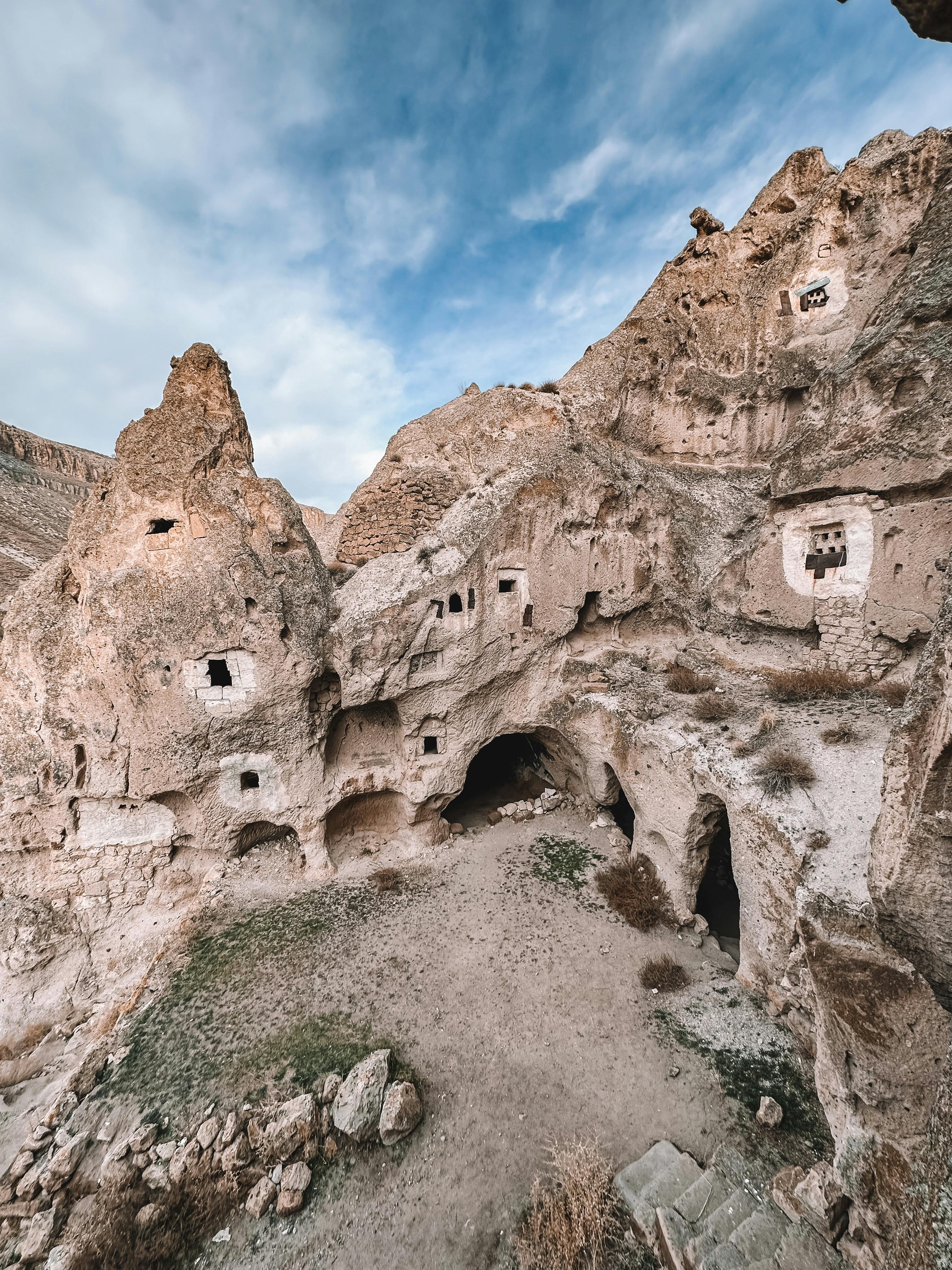 Manmade Caves in Rock Formation · Free Stock Photo