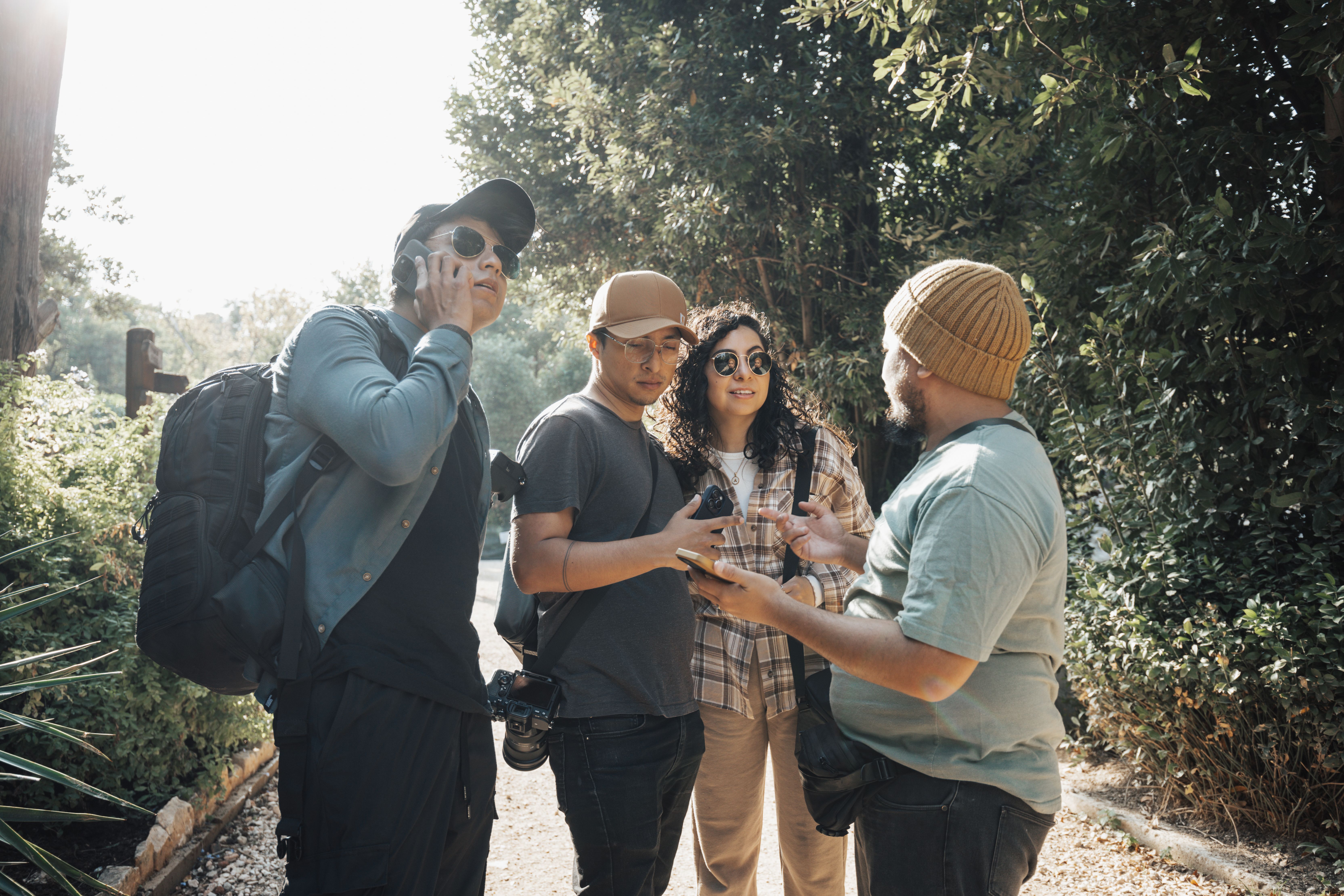 Group of Friends Exploring Nature Together · Free Stock Photo