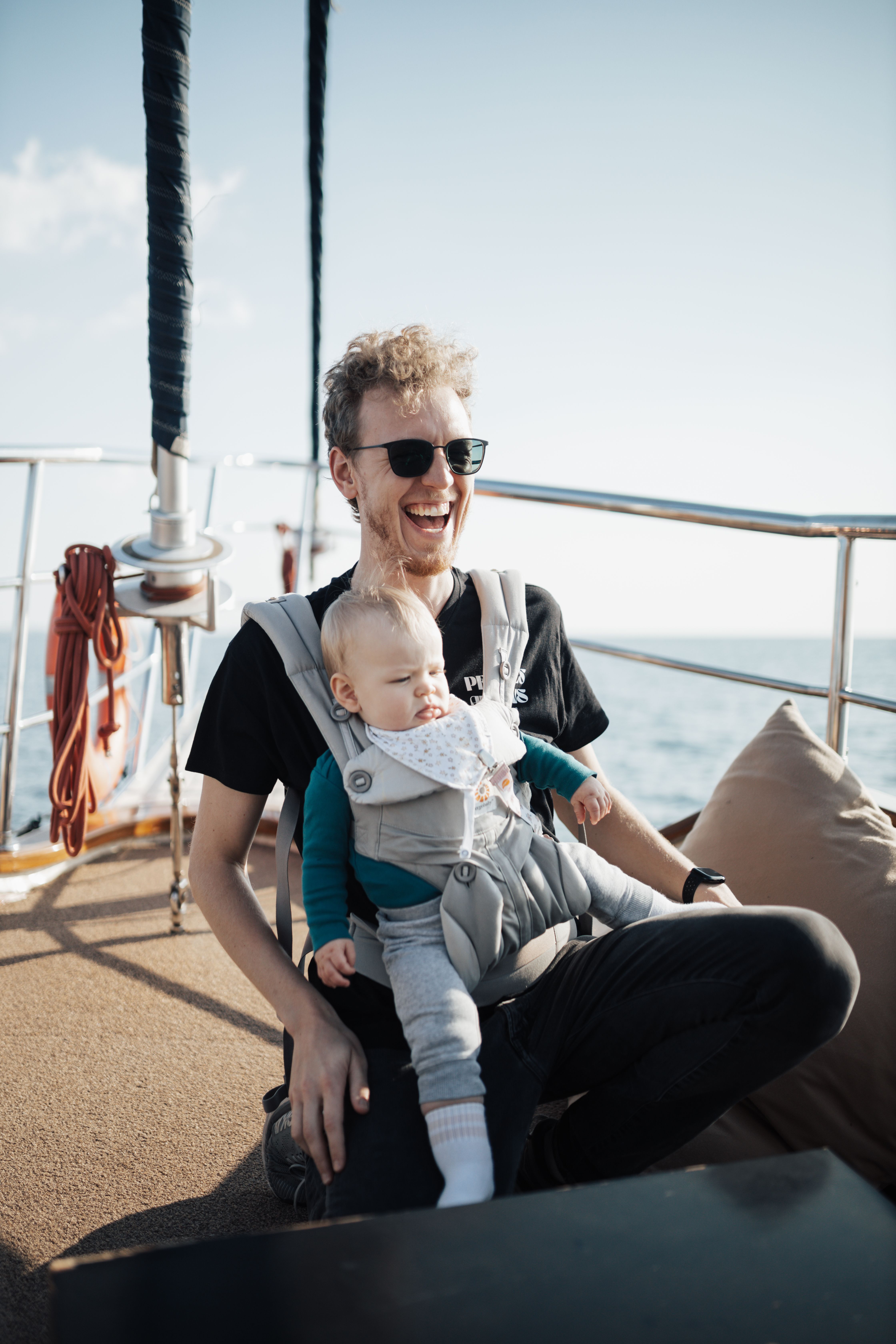Father and Baby Enjoying a Boat Ride Outdoors · Free Stock Photo