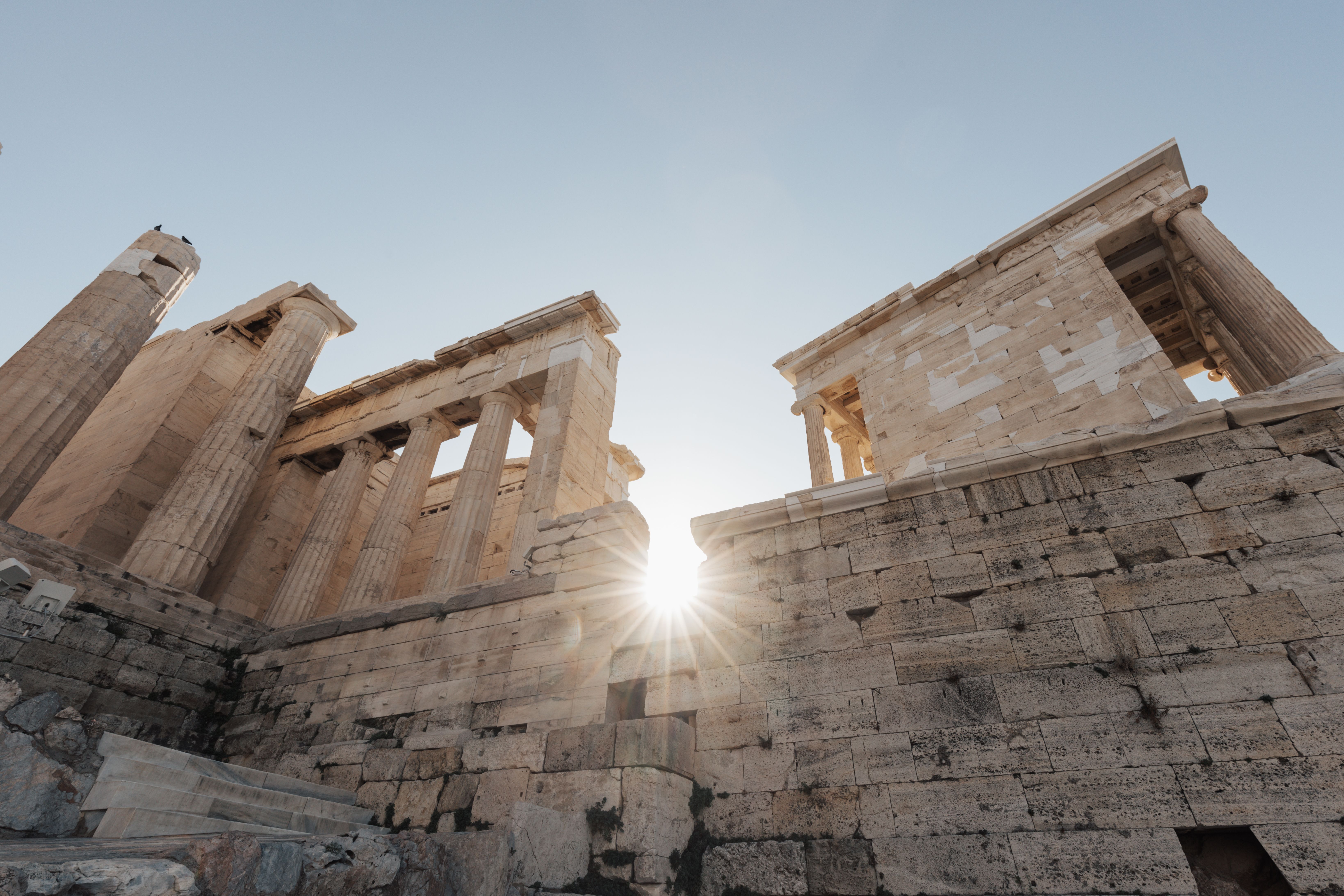 Ancient Greek Ruins with Sunburst at the Acropolis · Free Stock Photo