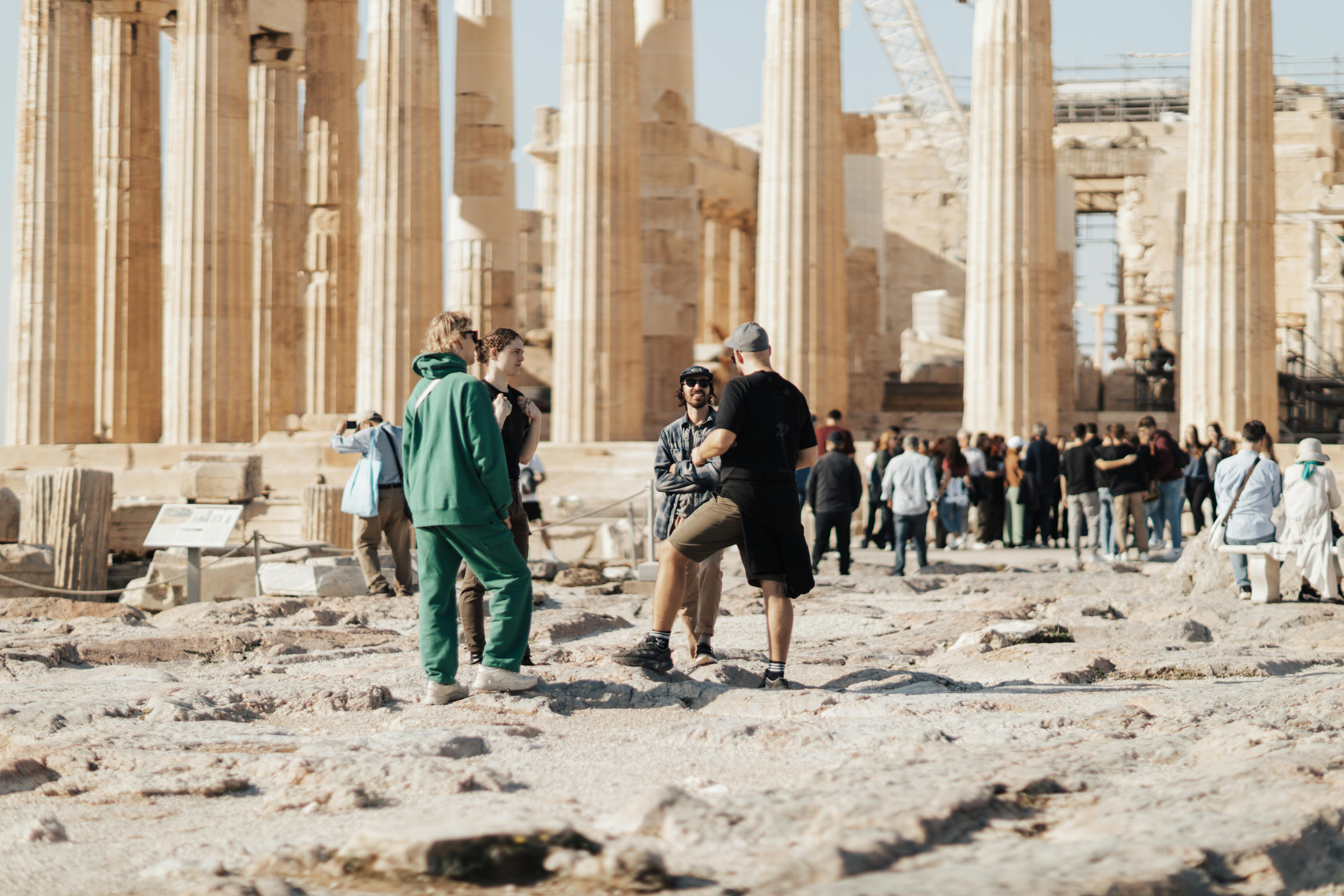 Tourists Exploring the Parthenon in Athens · Free Stock Photo