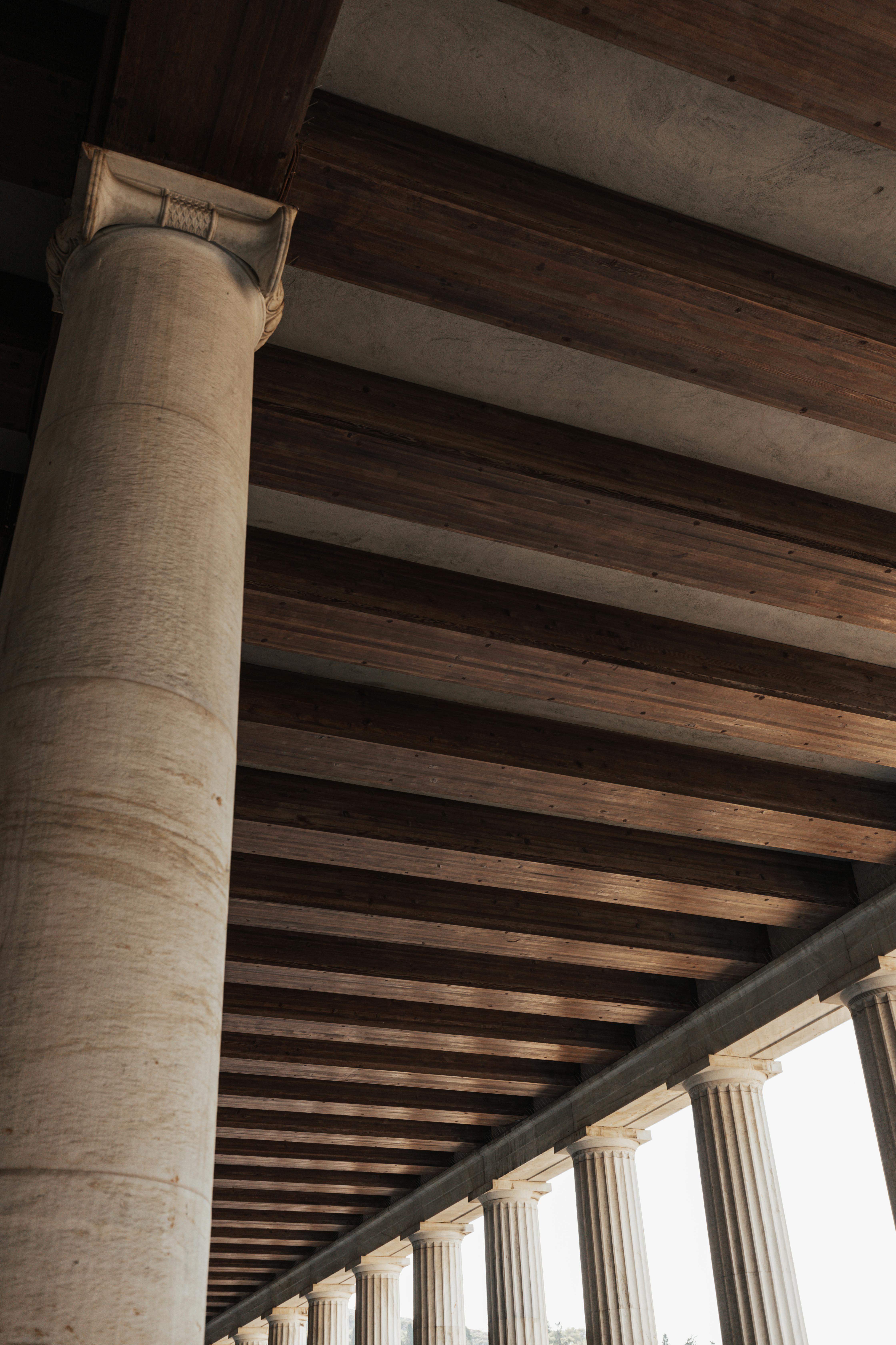 Symmetrical Ancient Columns in Architectural Perspective · Free Stock Photo