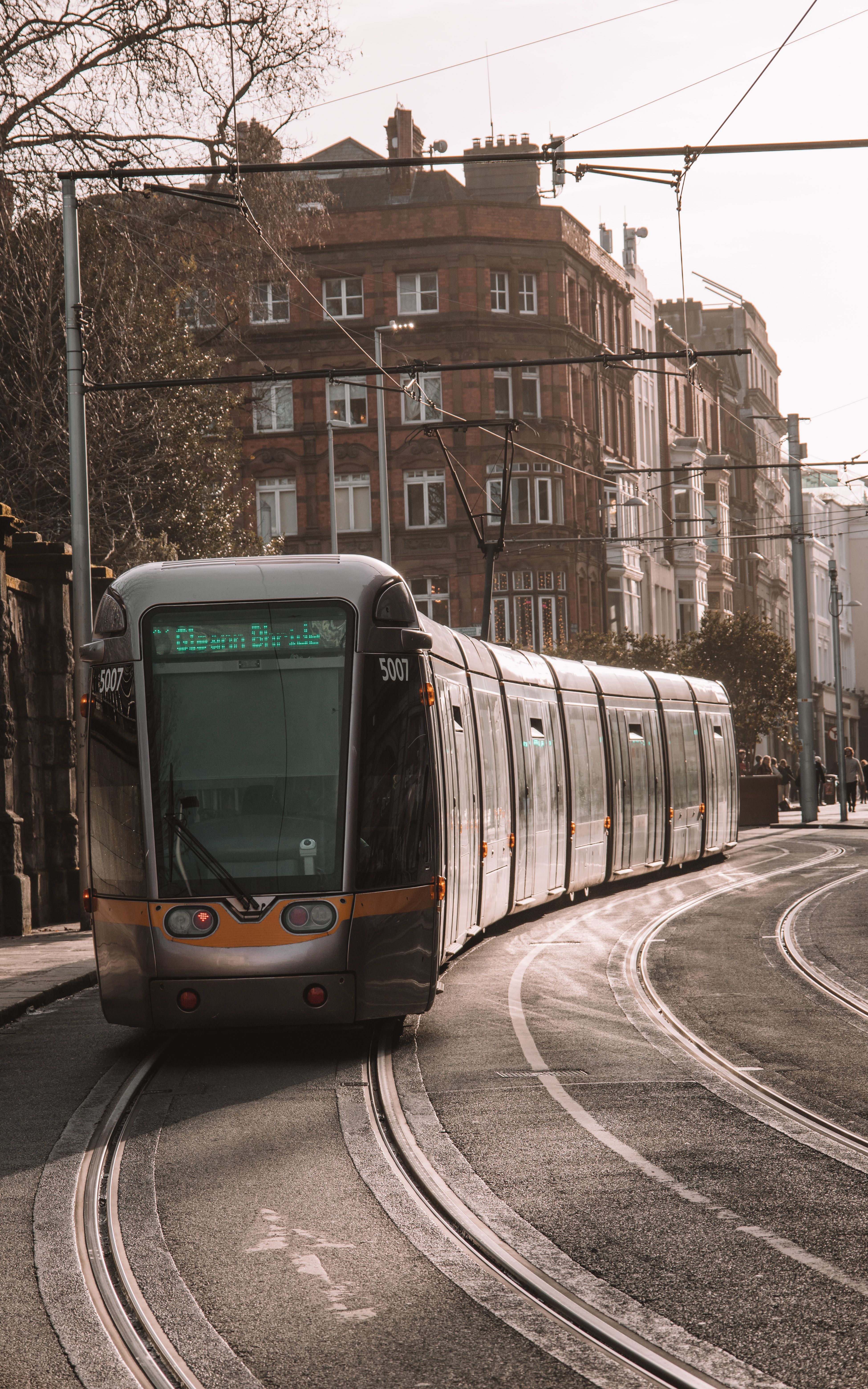 Tram Running on Street · Free Stock Photo