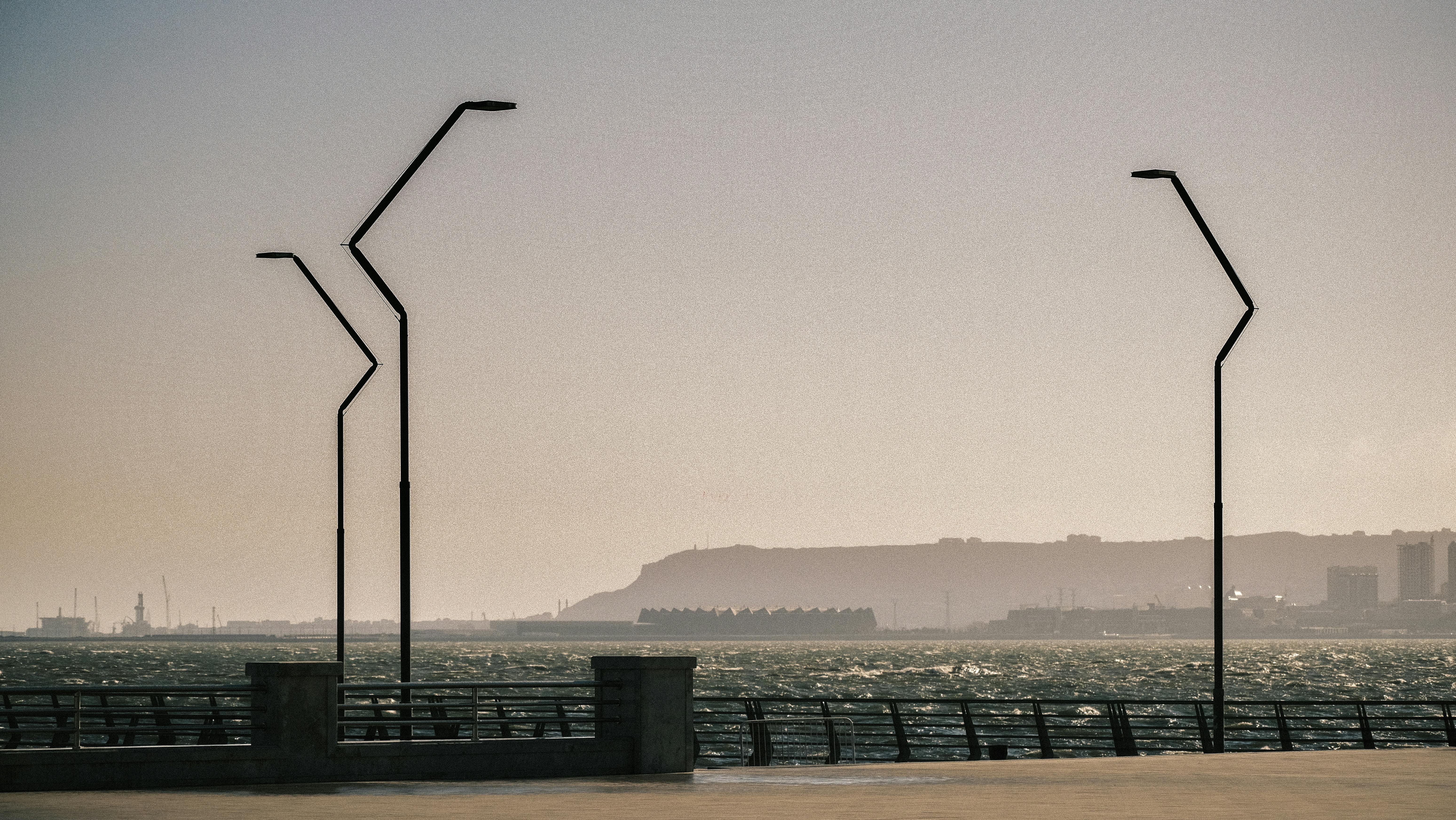 Empty promenade with benches and lanterns · Free Stock Photo