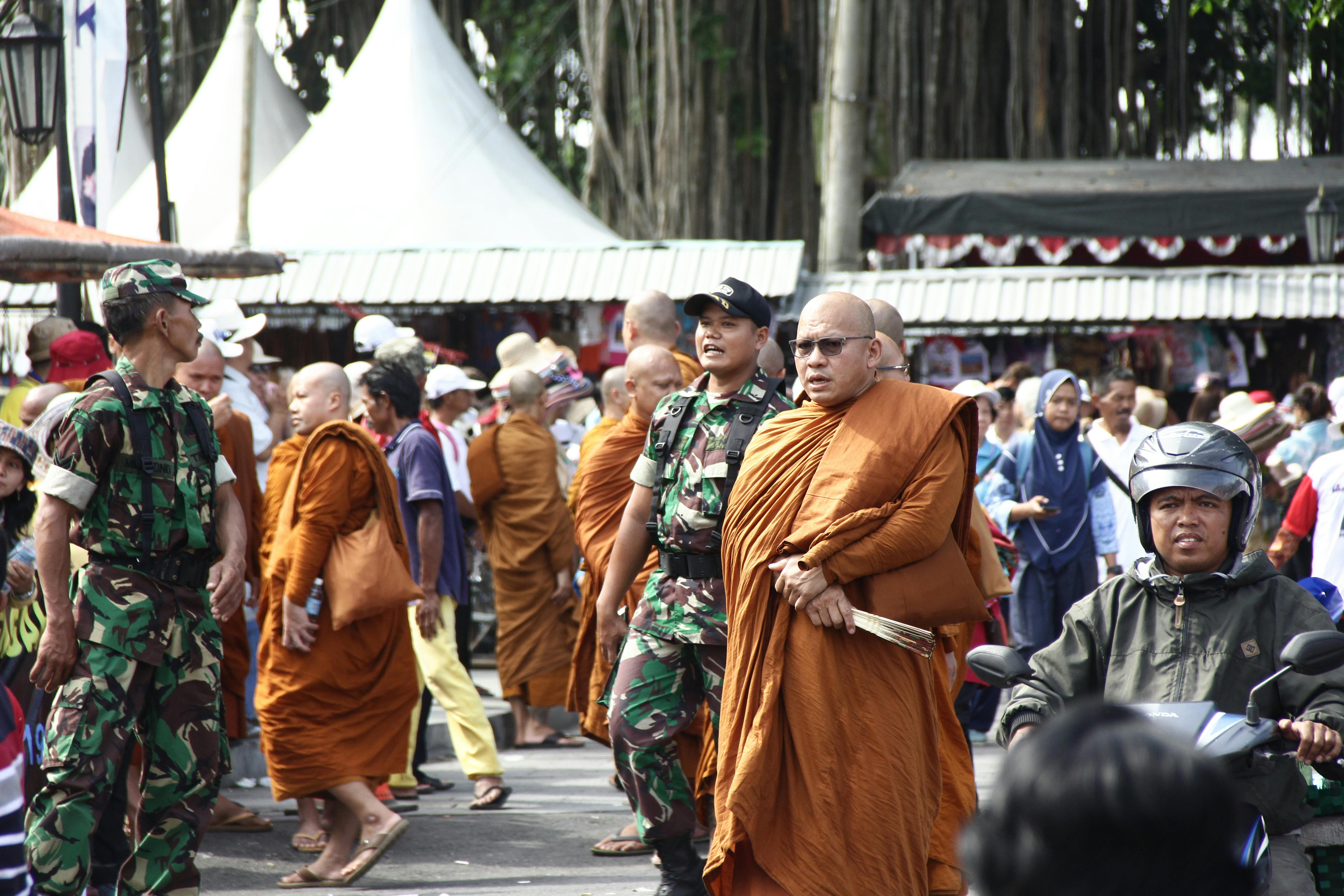 Monks and Soldiers in a City · Free Stock Photo