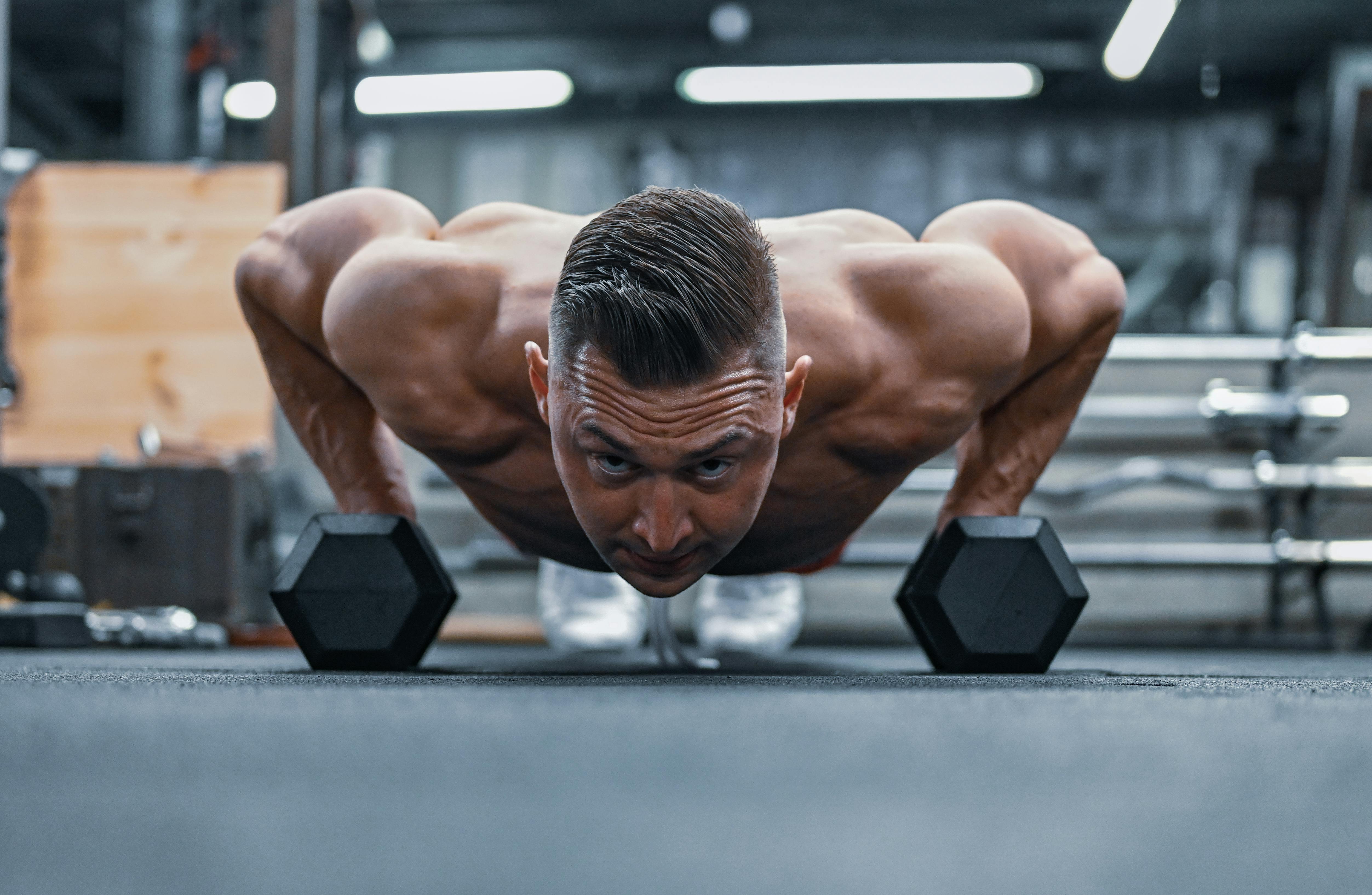 Man Doing a Push Up in a Gym · Free Stock Photo
