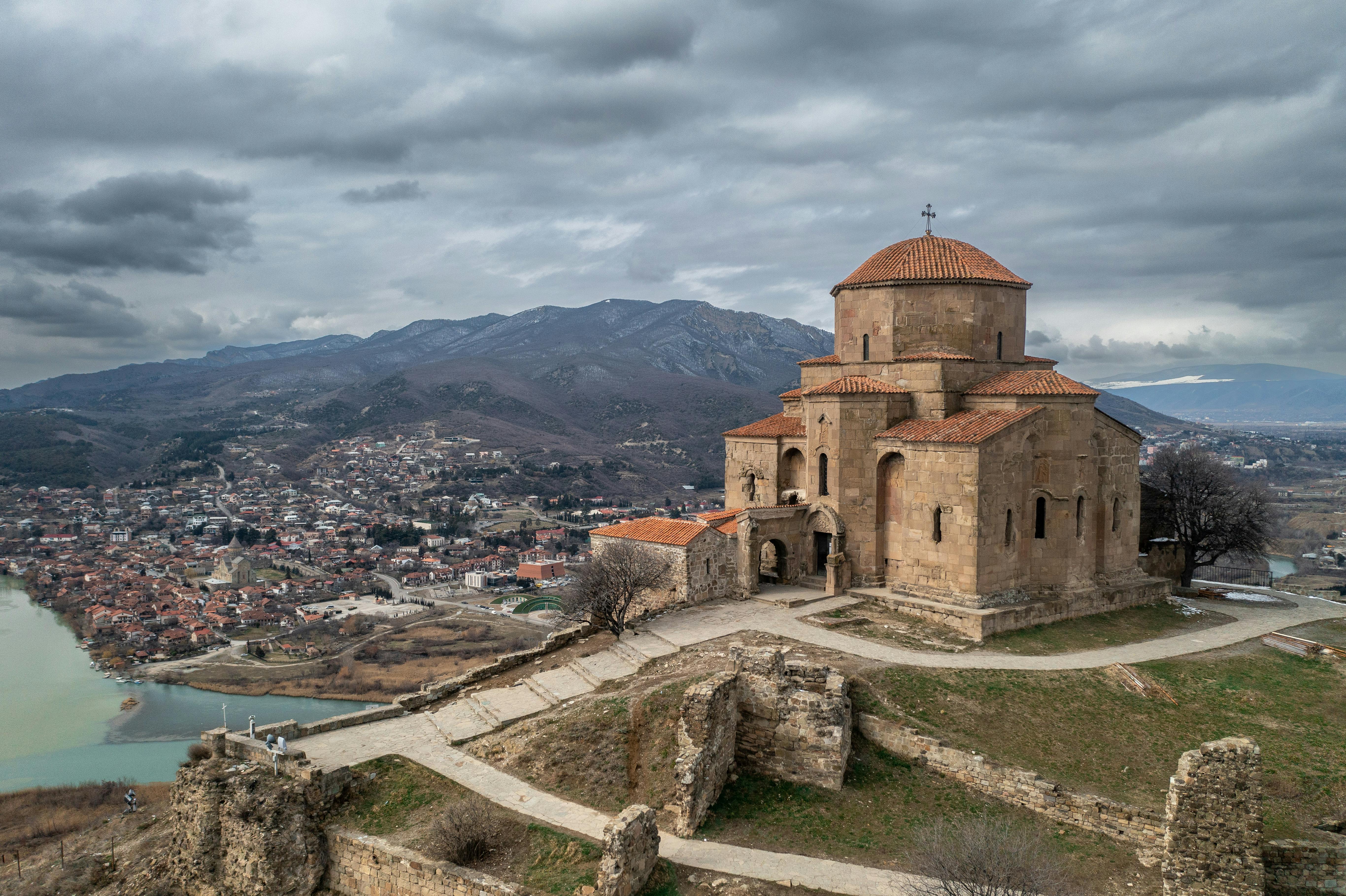 Jvari Monastery over Town in Georgia · Free Stock Photo