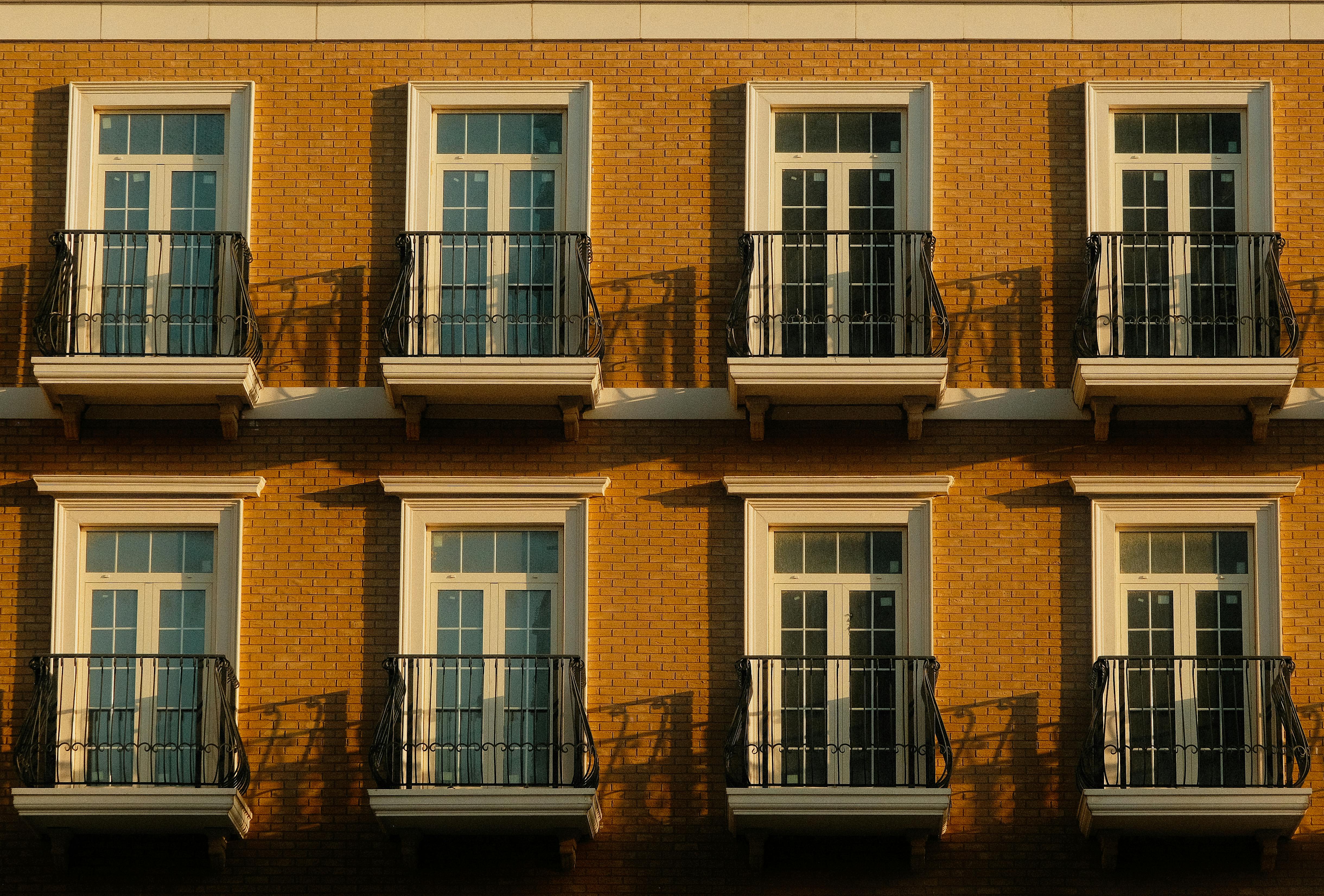 Multi-colored Concrete Building · Free Stock Photo