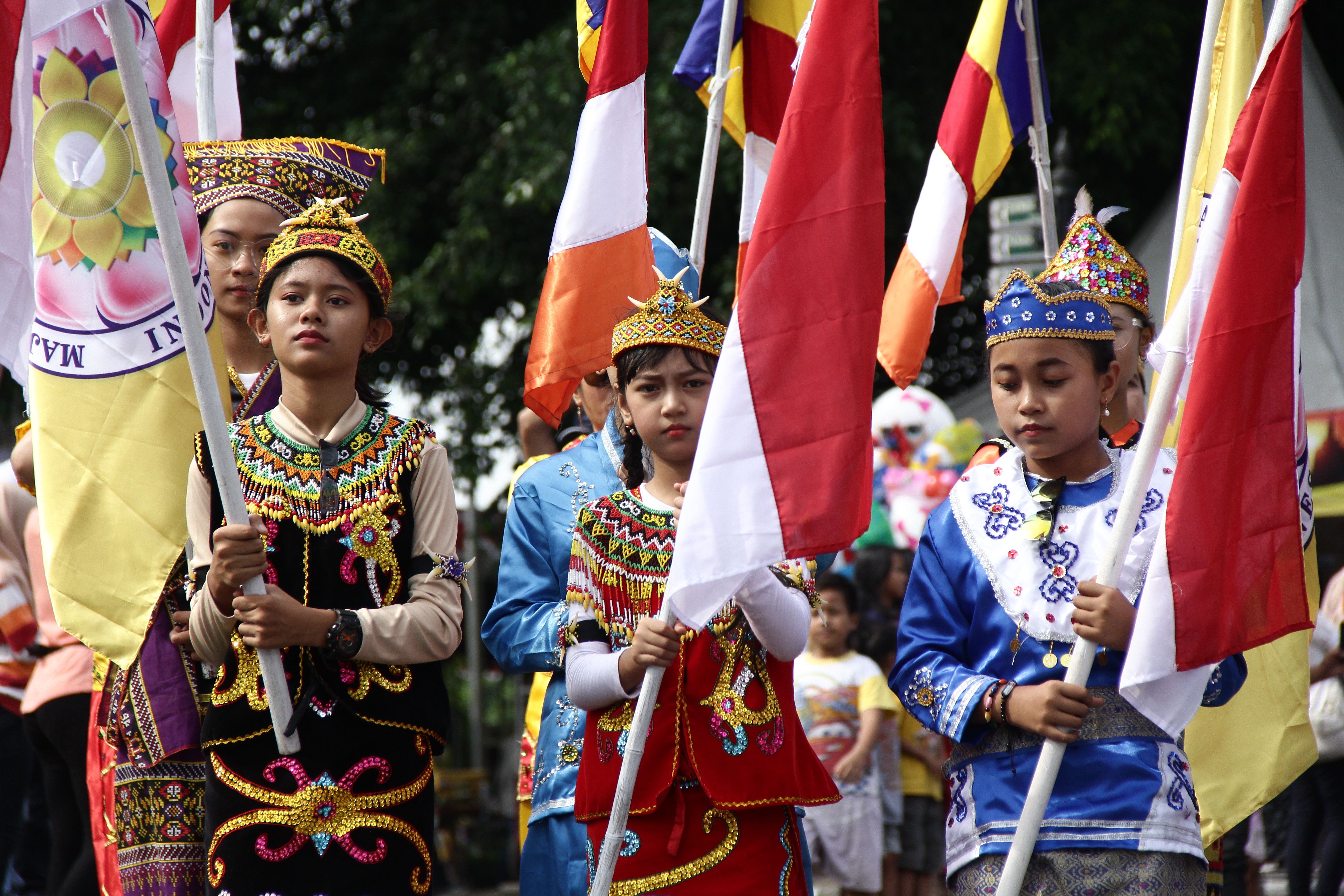 Children in Traditional Clothing Standing with Flags · Free Stock Photo
