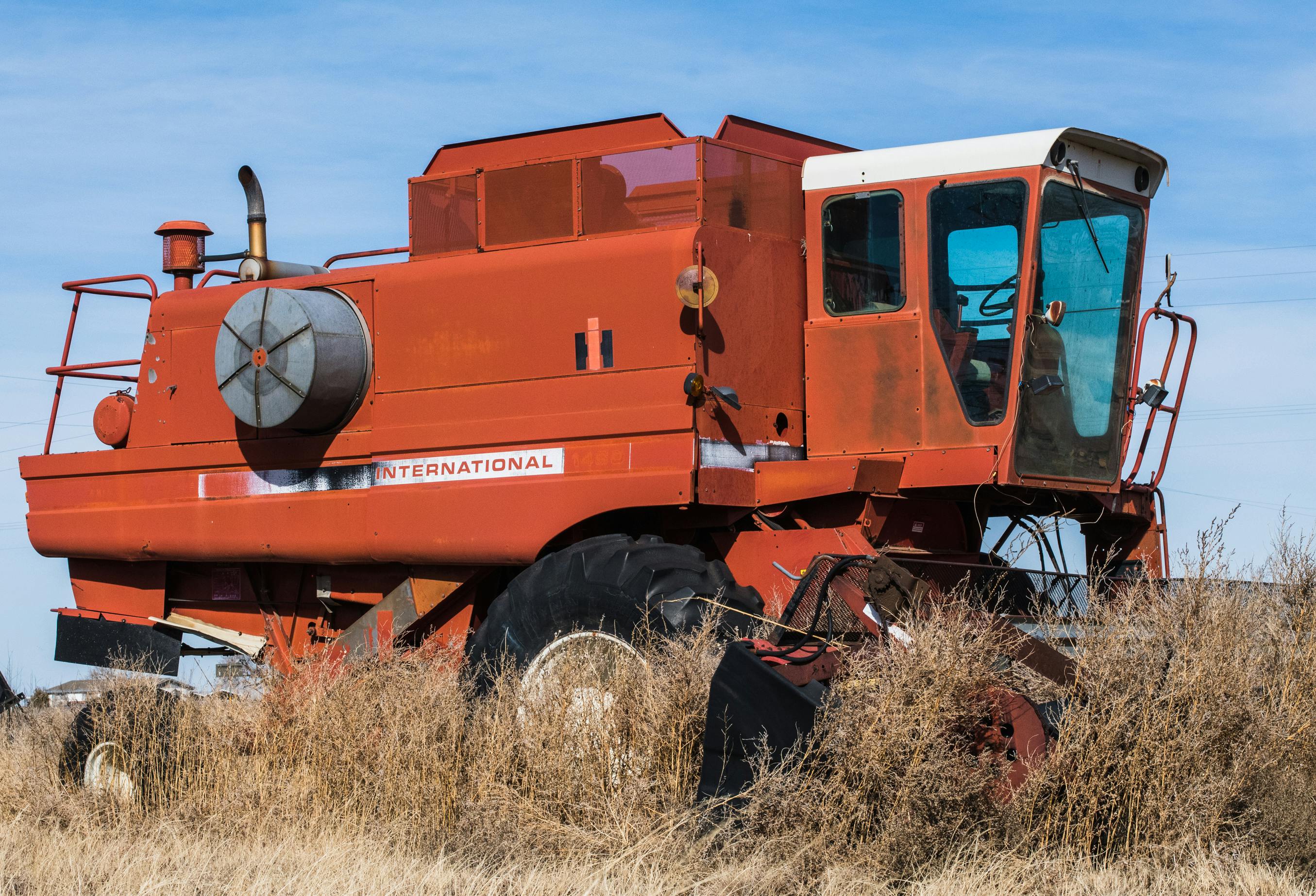 A Red Combine Harvester · Free Stock Photo