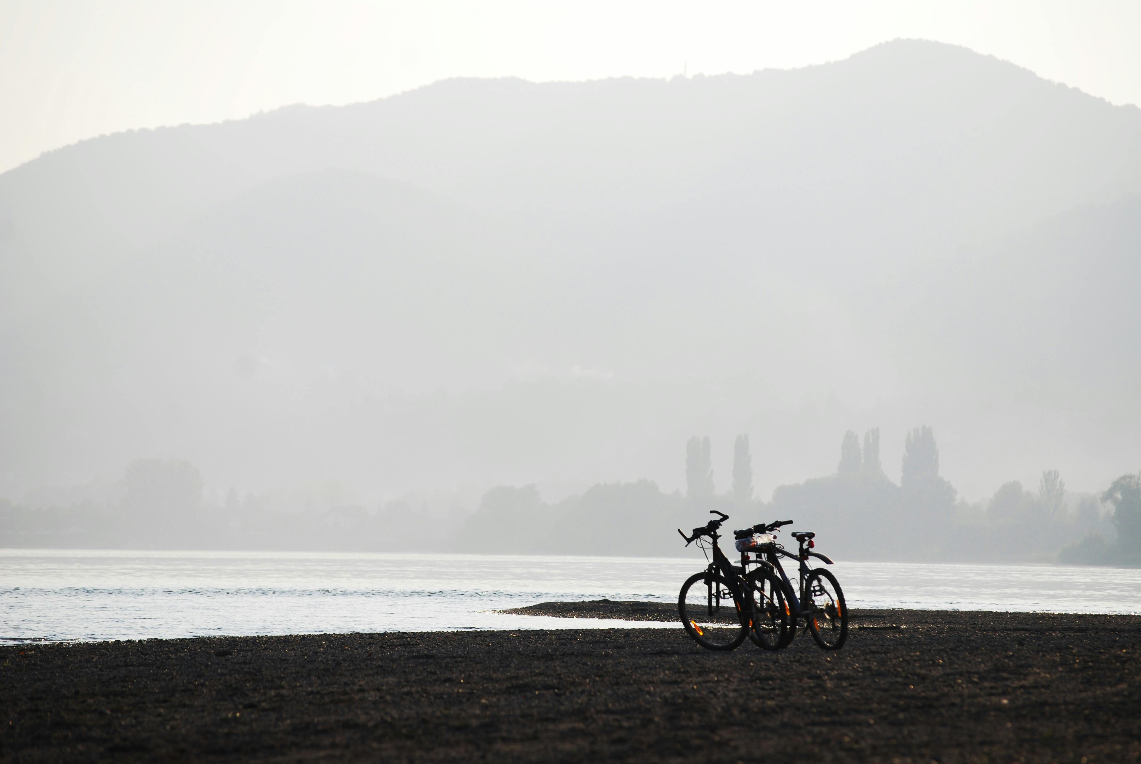 Bikes on Beach under Fog · Free Stock Photo